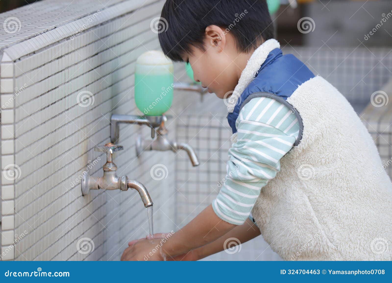 Boy washing his hands stock image. Image of health, faucet - 324704463