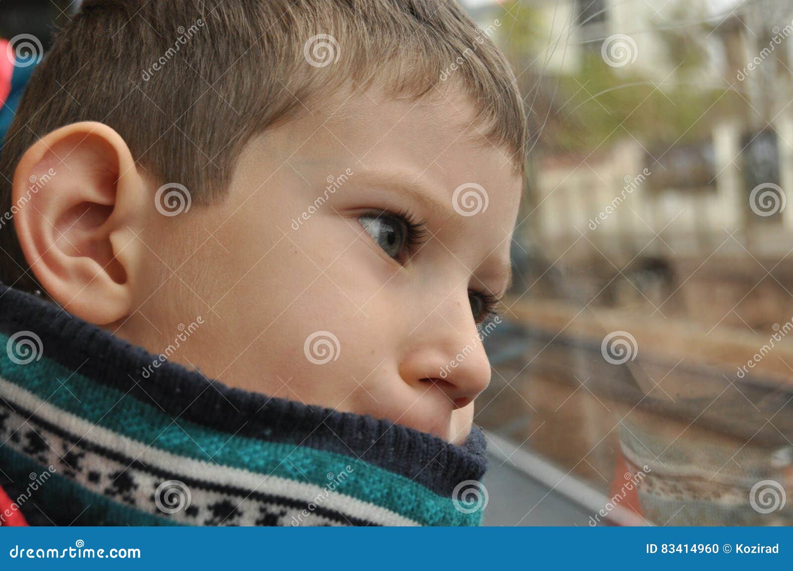 Boy Watching the City through the Window Stock Photo - Image of window ...