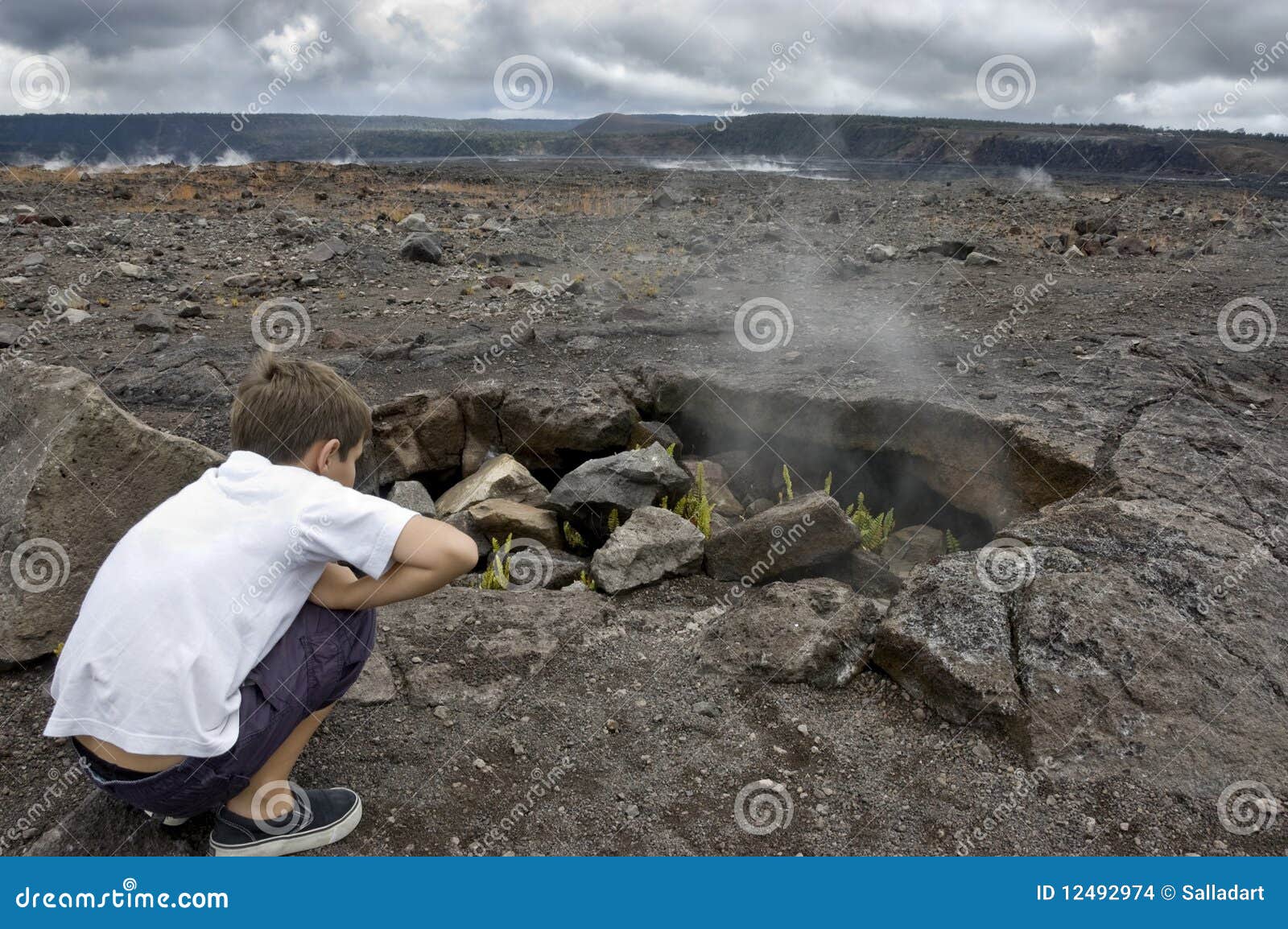 Boy Watching Steam Coming Out of Lava Hole. Stock Photo - Image of ...
