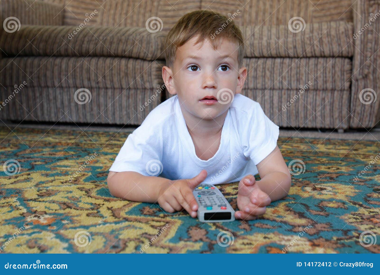 Boy watching tv at home stock photo. Image of white, switch - 14172412
