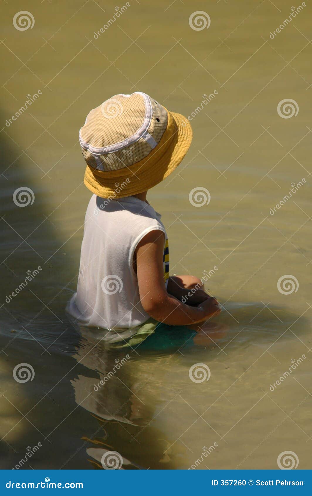 Boy in water stock photo. Image of shirt, play, youth, relaxation - 357260