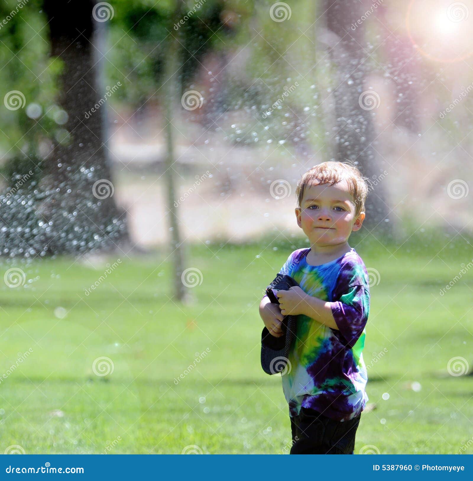 Boy and Water stock photo. Image of sunny, season, blond - 5387960