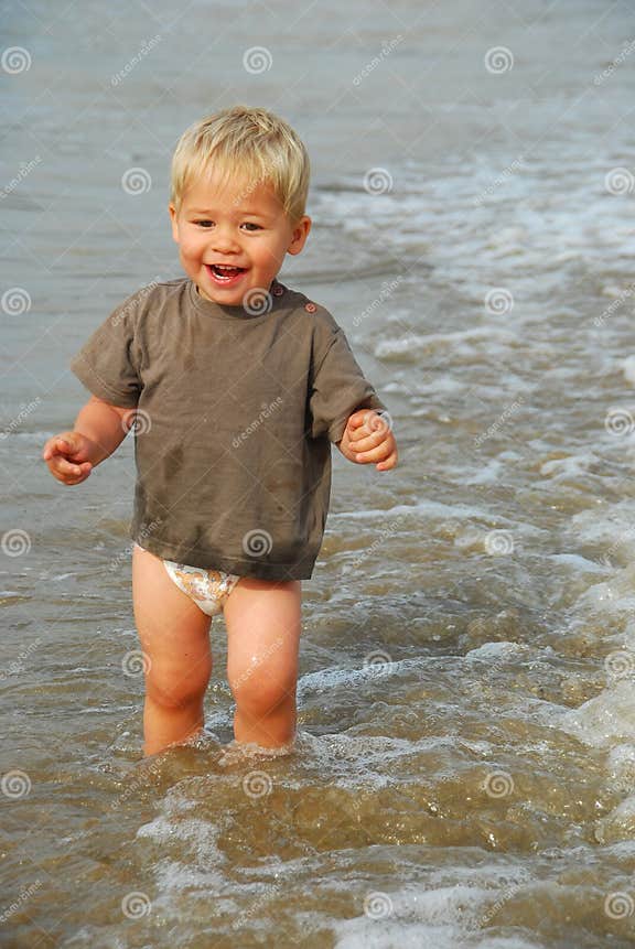Boy in the water stock image. Image of growth, holiday - 9613957