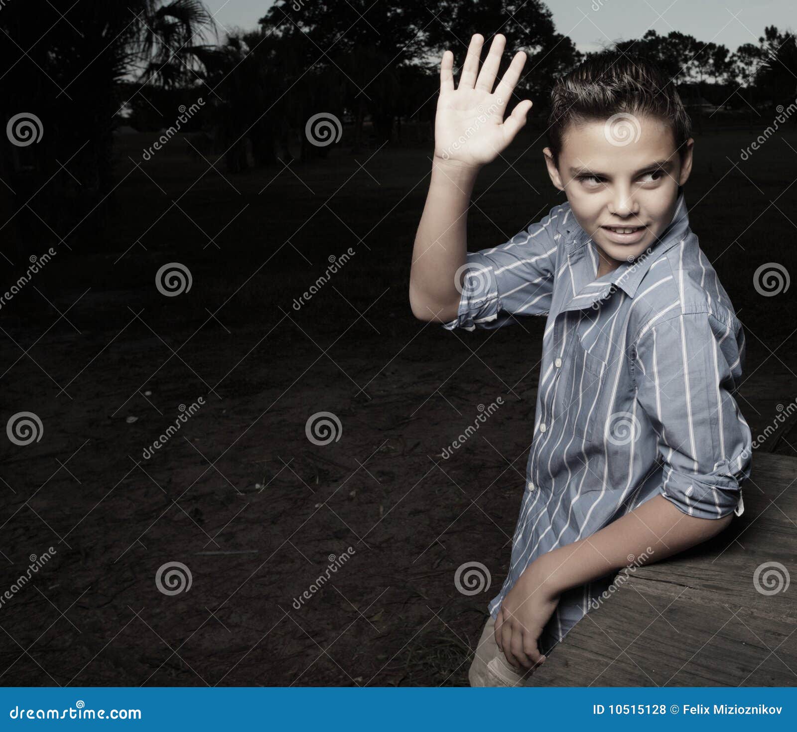 Boy waving and smiling stock photo. Image of outdoors - 10515128