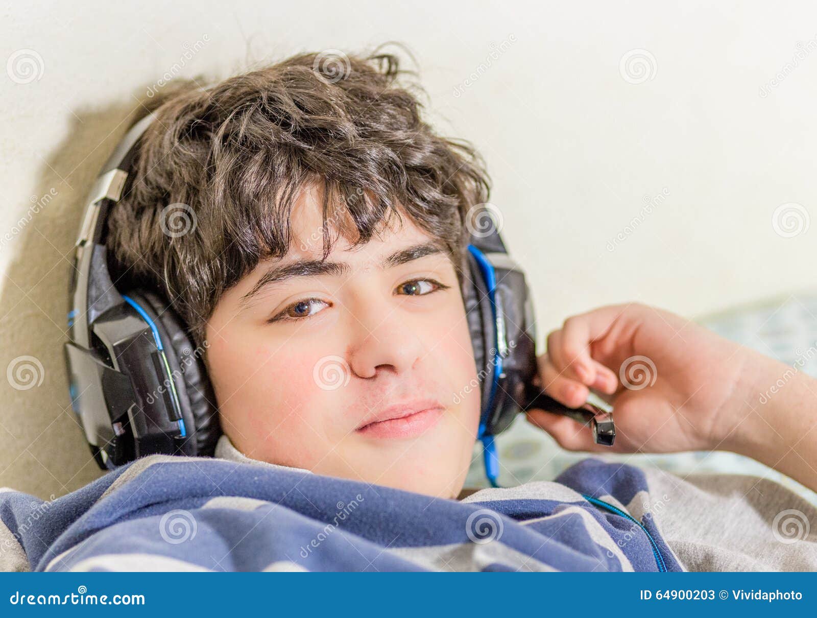 Boy wearing headphones stock image. Image of leisure - 64900203
