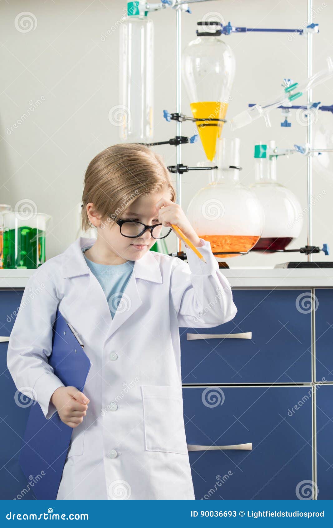 Boy Wearing Lab Coat in Science Laboratory Stock Image - Image of ...