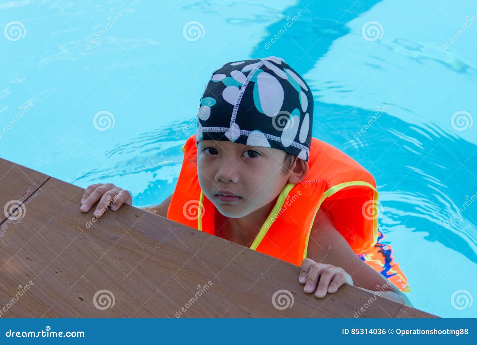 A Boy Wearing a Life Jacket Stock Photo - Image of jacket, happy: 85314036