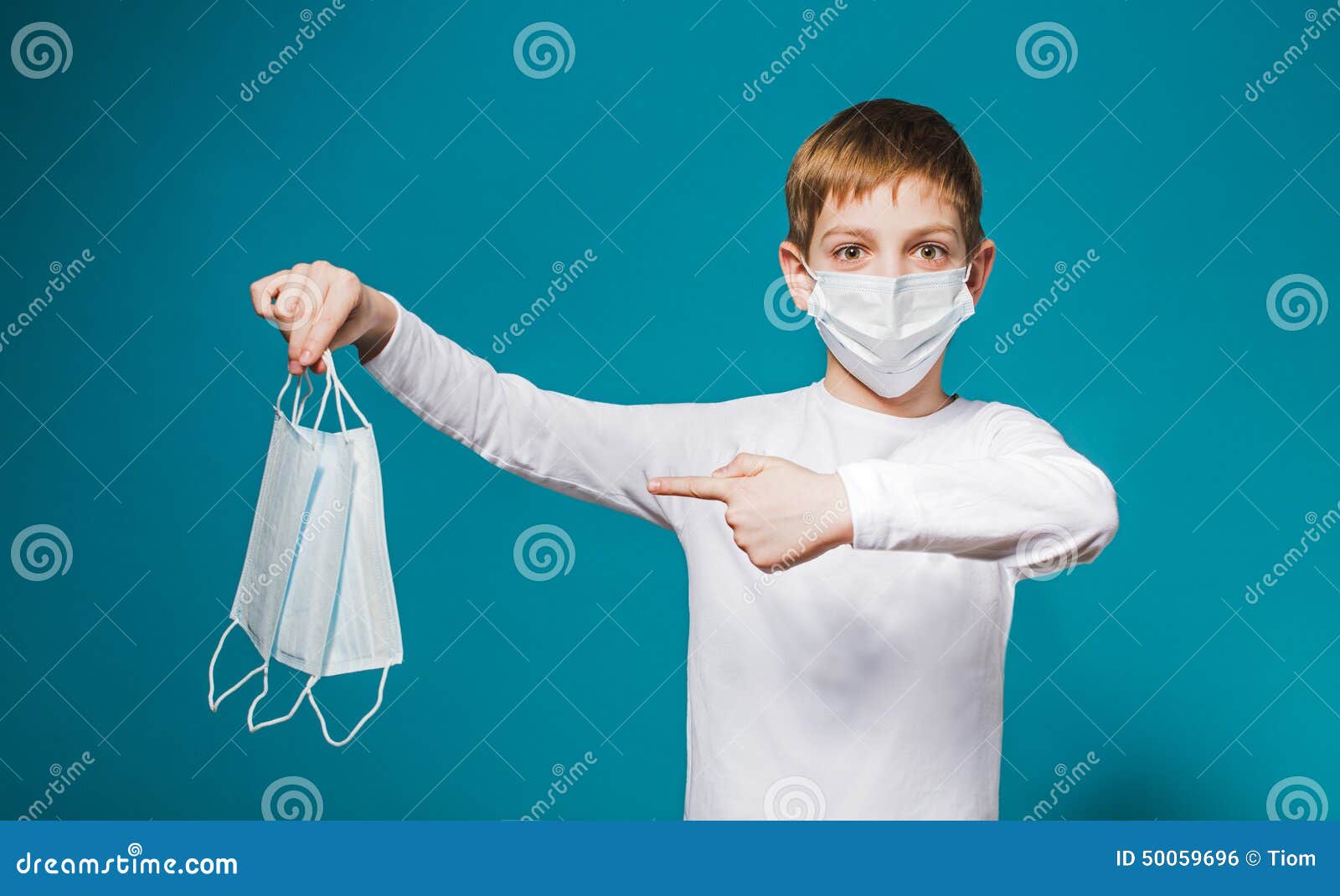 Boy Wearing Protection Mask Pointing on Masks Stock Photo - Image of ...