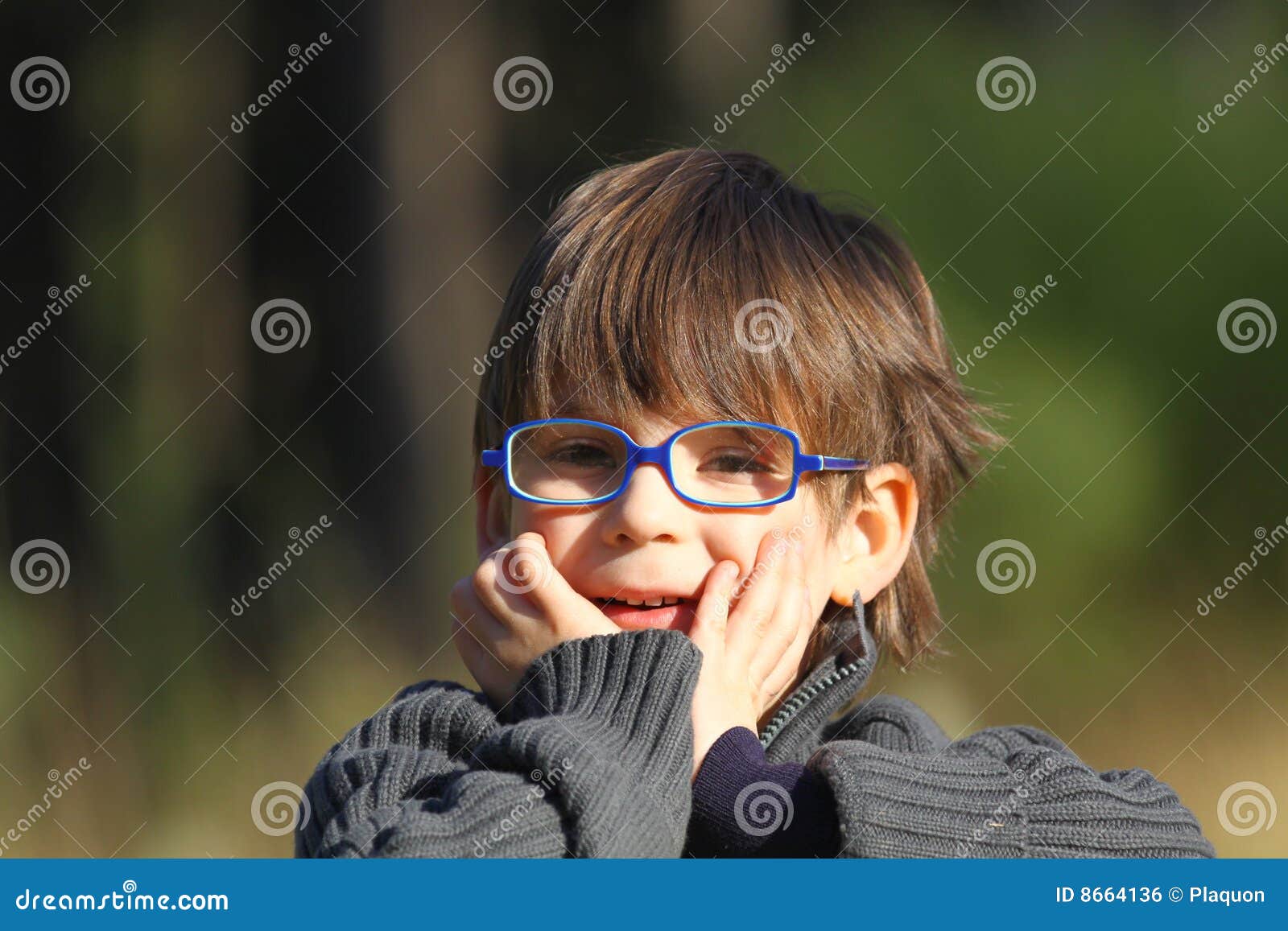 Boy wearing spectacles stock photo. Image of cute, holds - 8664136