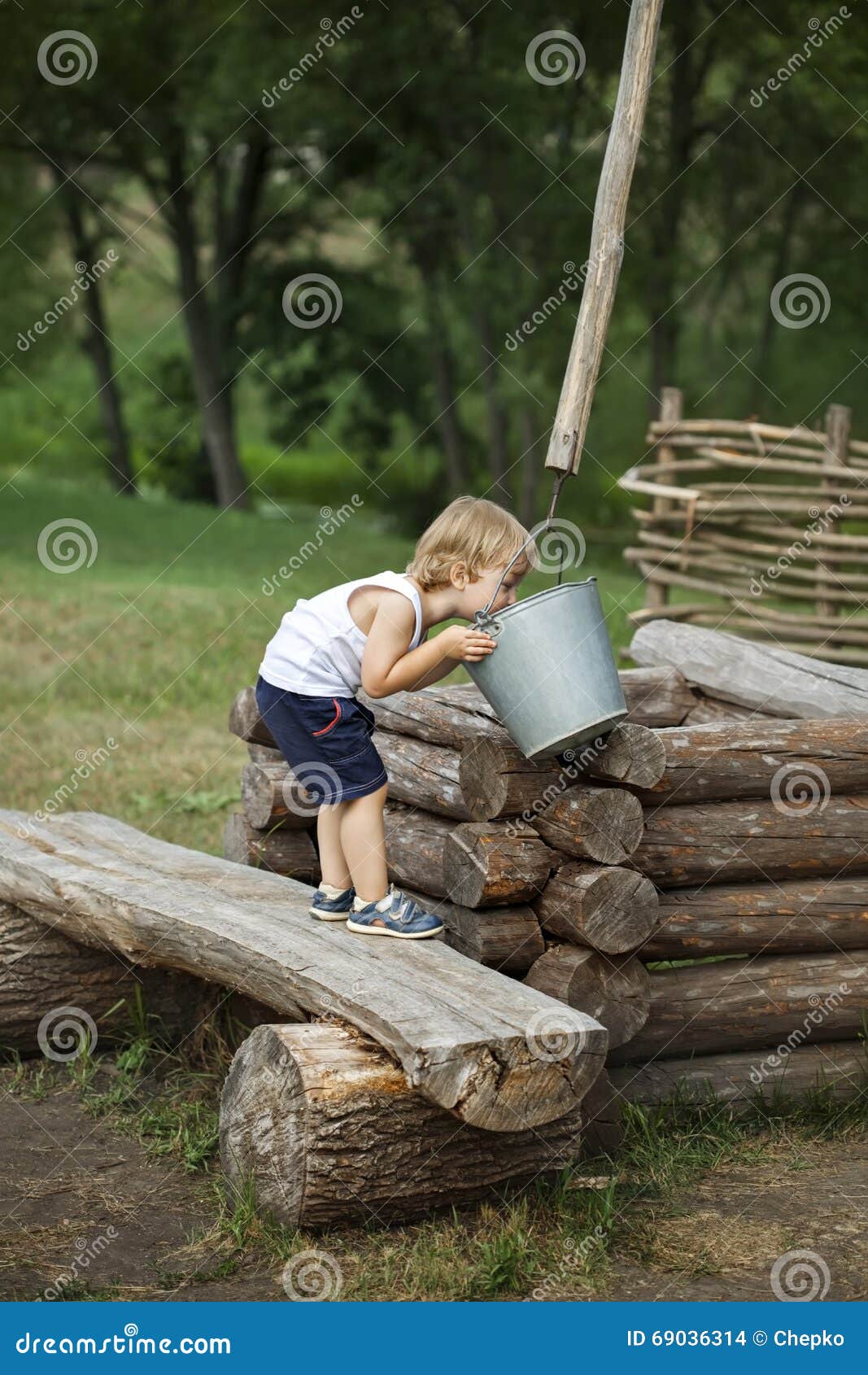 Boy at Well of Water in the Village Stock Photo - Image of flowing ...