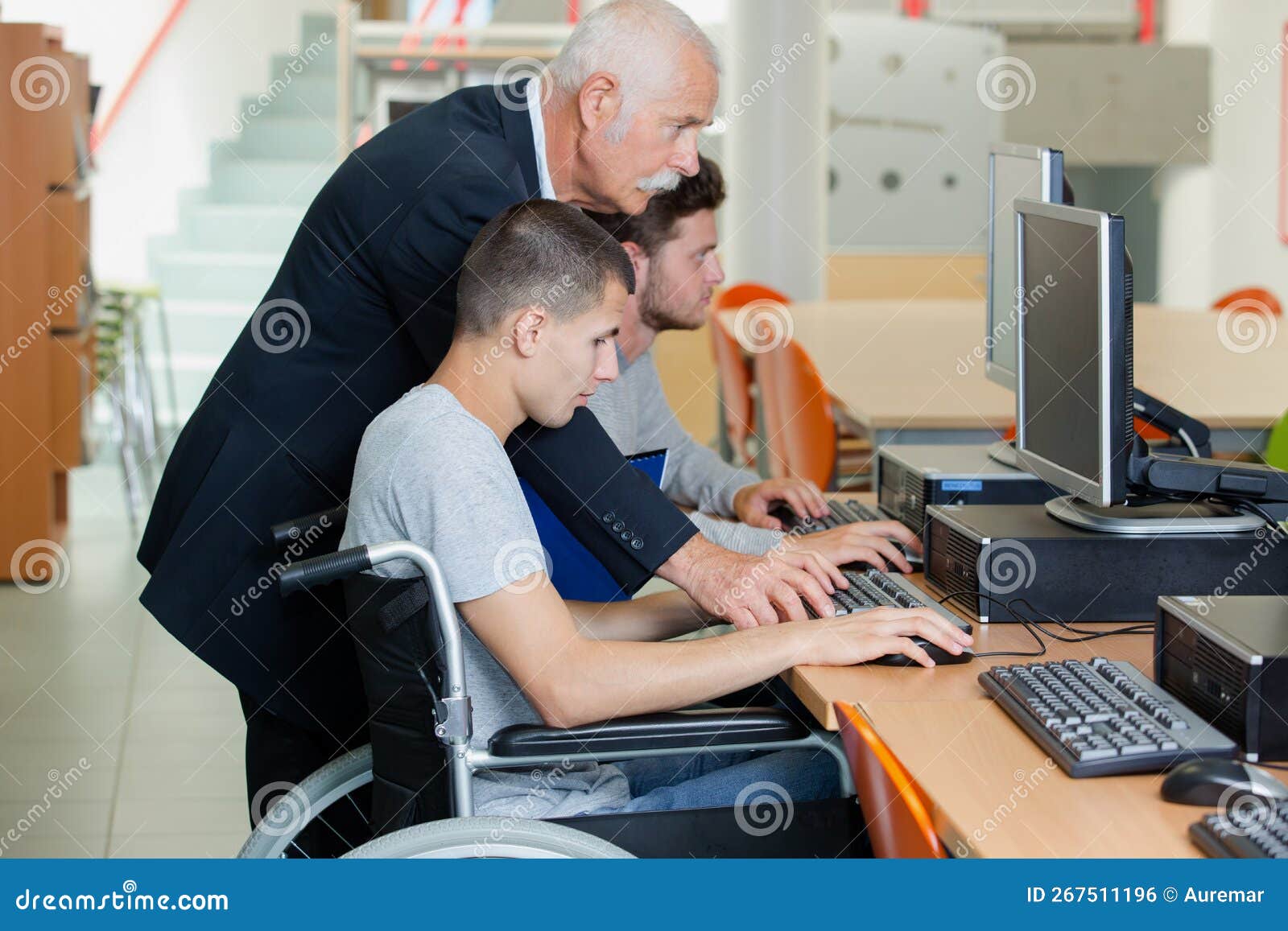 Boy in wheelchair in class stock photo. Image of teacher - 267511196