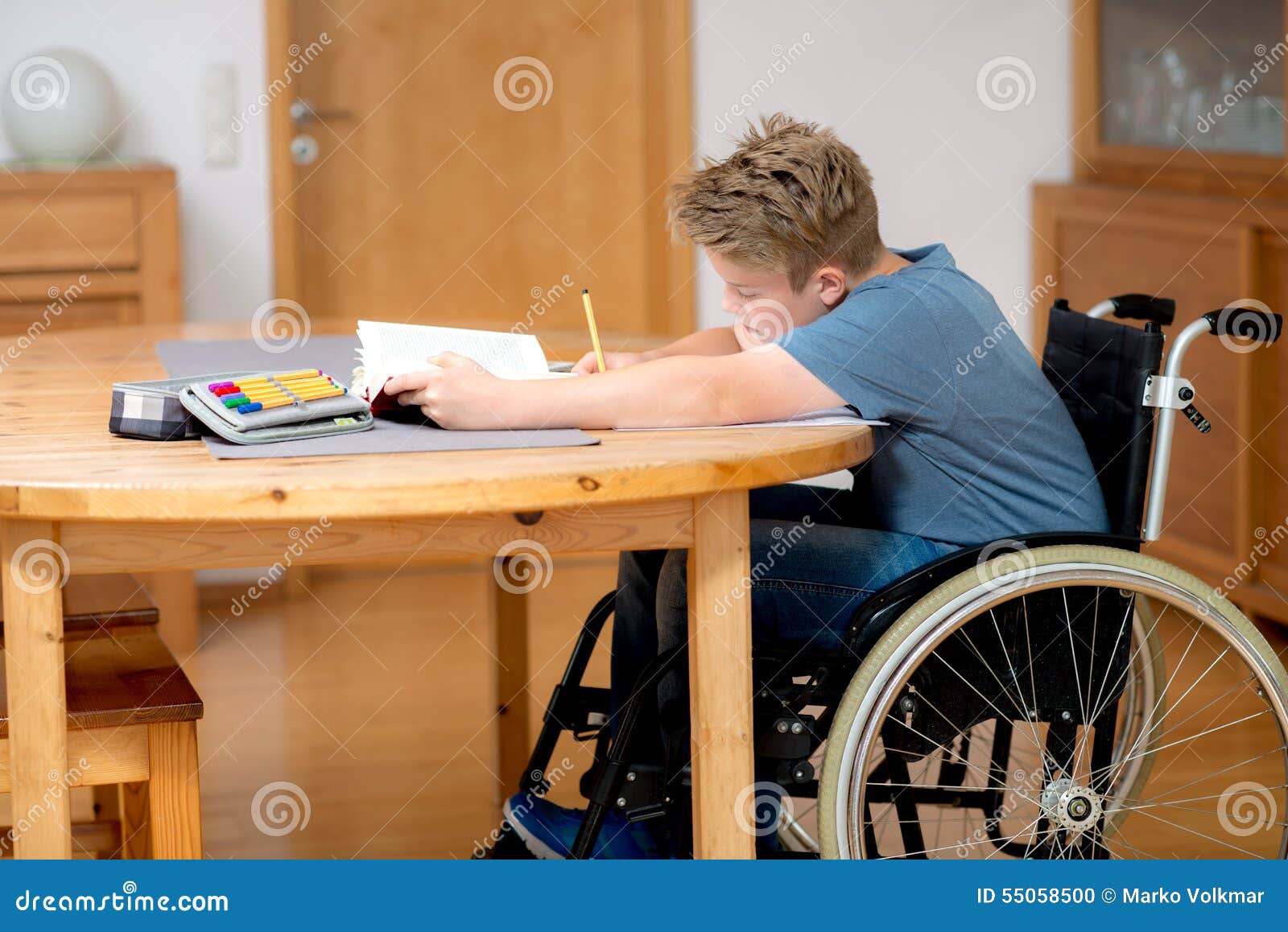 Boy in Wheelchair Doing Homework Stock Photo - Image of handicap ...