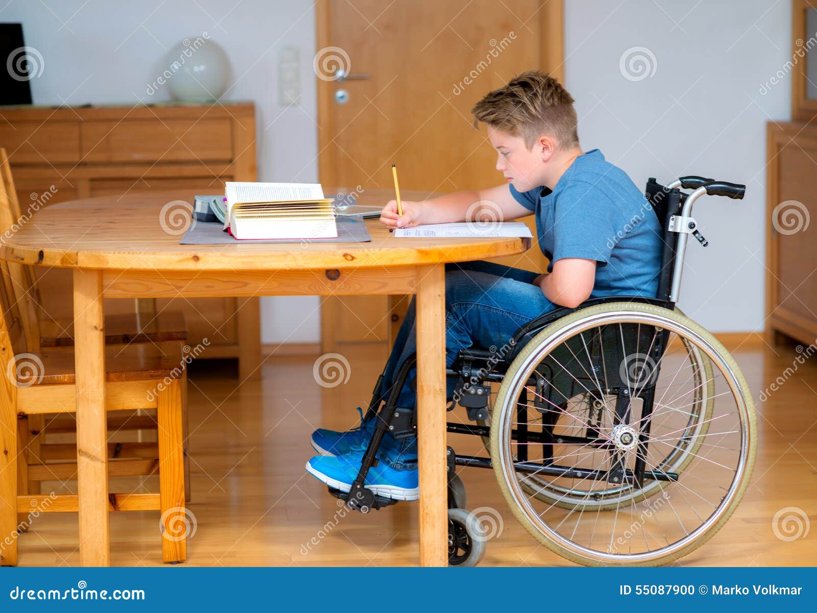 Boy in Wheelchair Doing Homework Stock Photo - Image of handicap, happy ...
