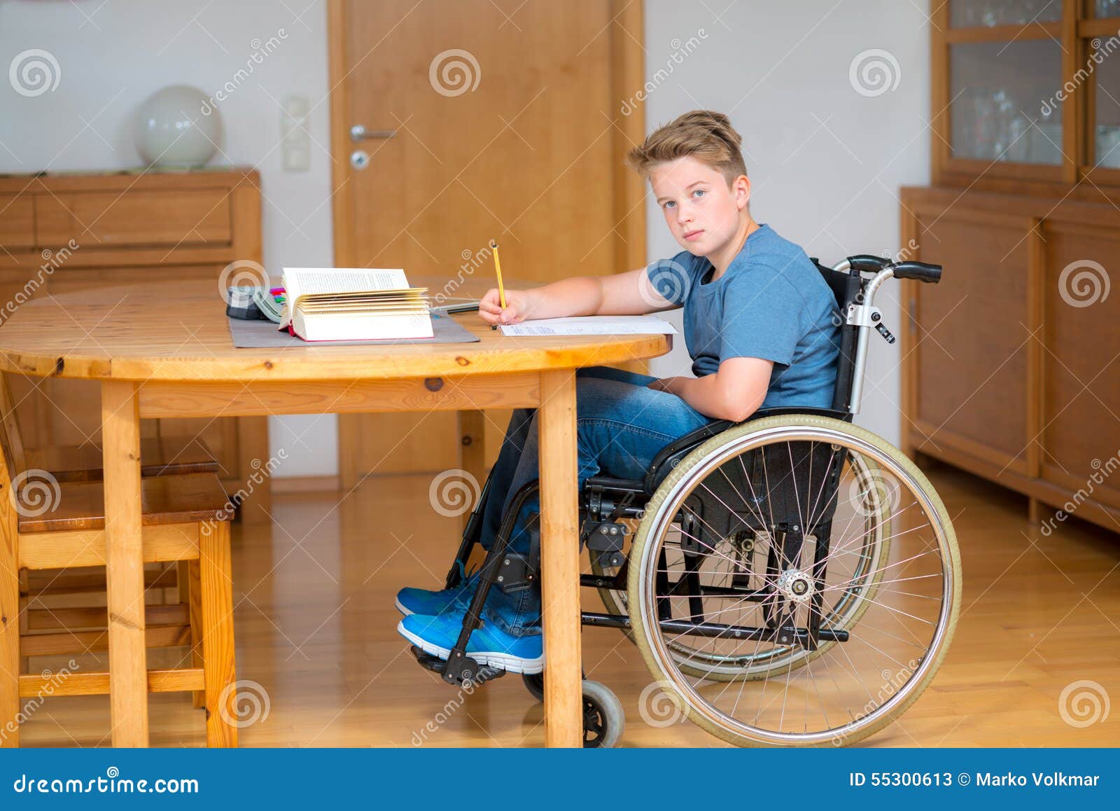 Boy in Wheelchair Doing Homework Stock Image - Image of mobility ...