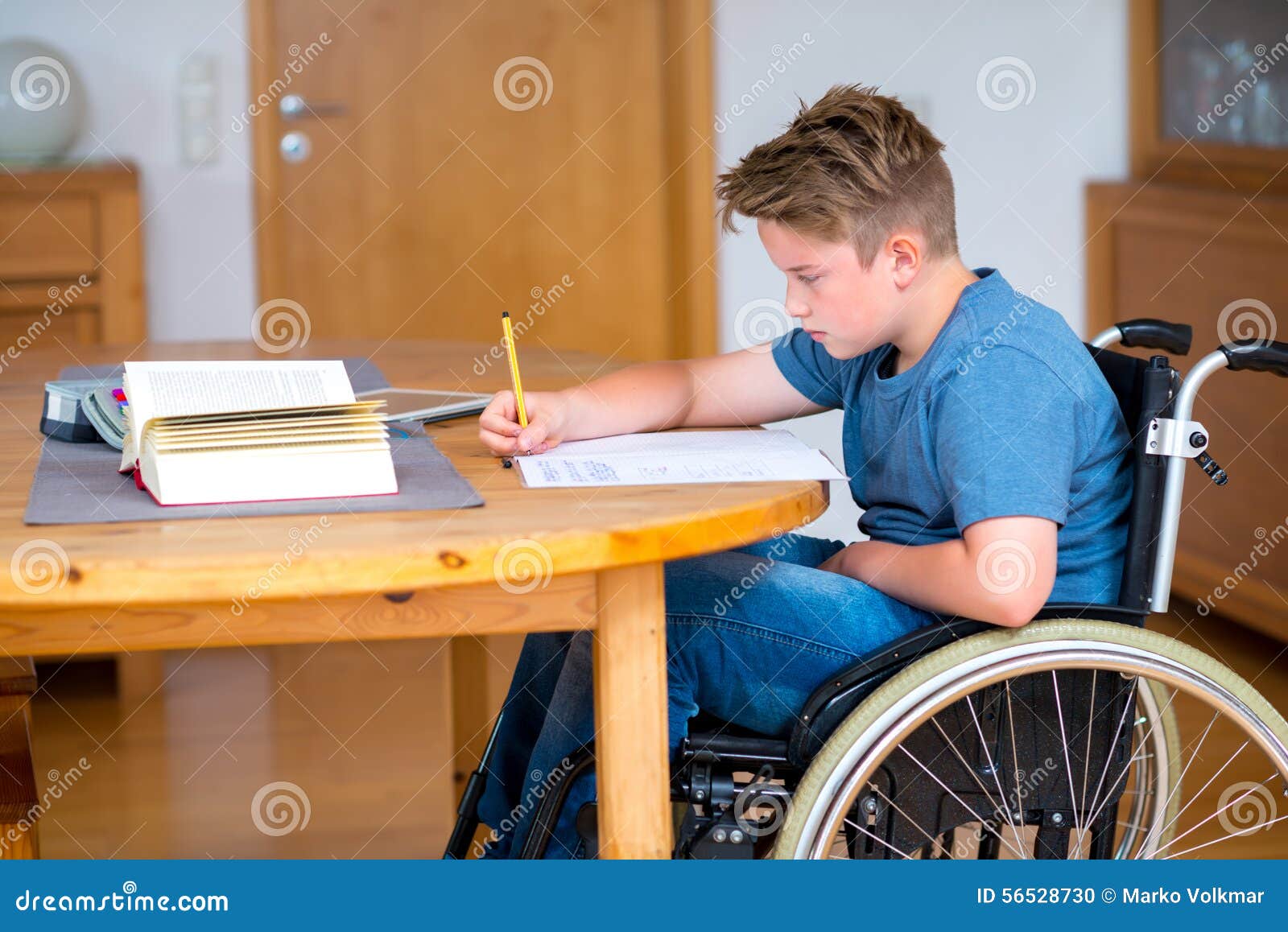 Boy in Wheelchair Doing Homework Stock Photo - Image of children, male ...