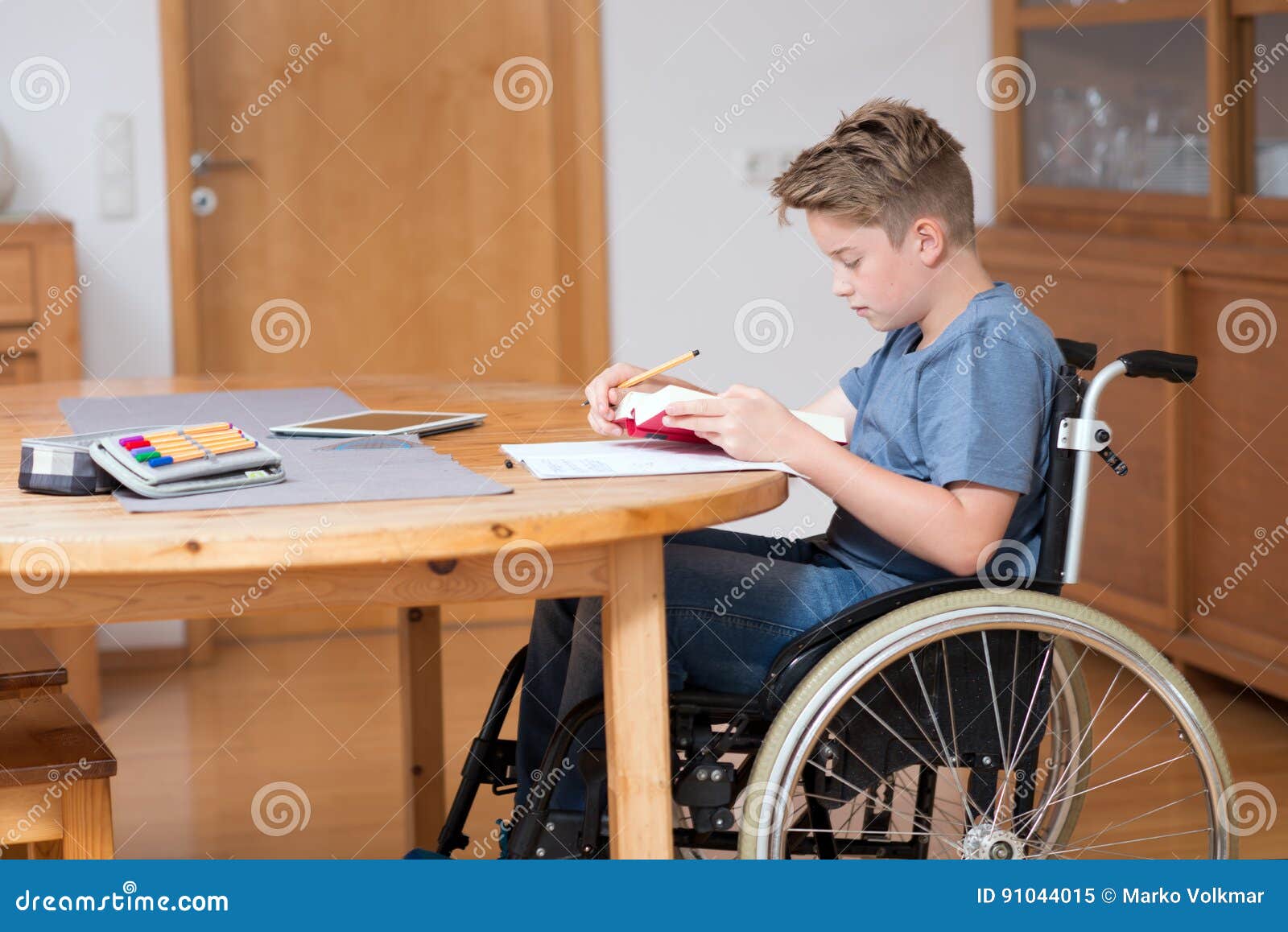 Boy in Wheelchair Doing Homework Stock Image - Image of education ...