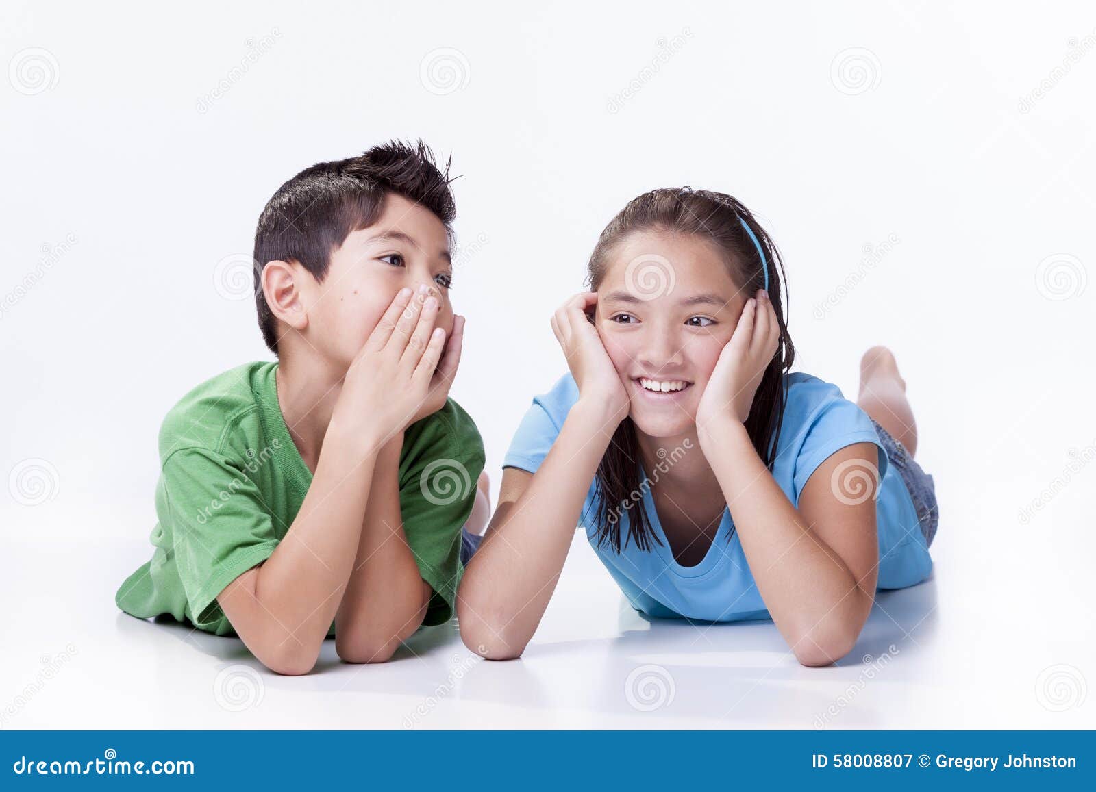 Boy whispers to sister. stock image. Image of secret - 58008807