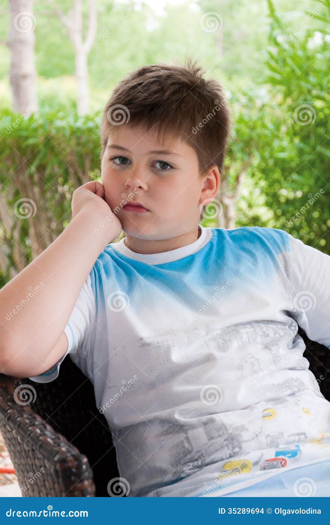 Boy in a Wicker Chair on the Terrace Stock Photo - Image of trees ...