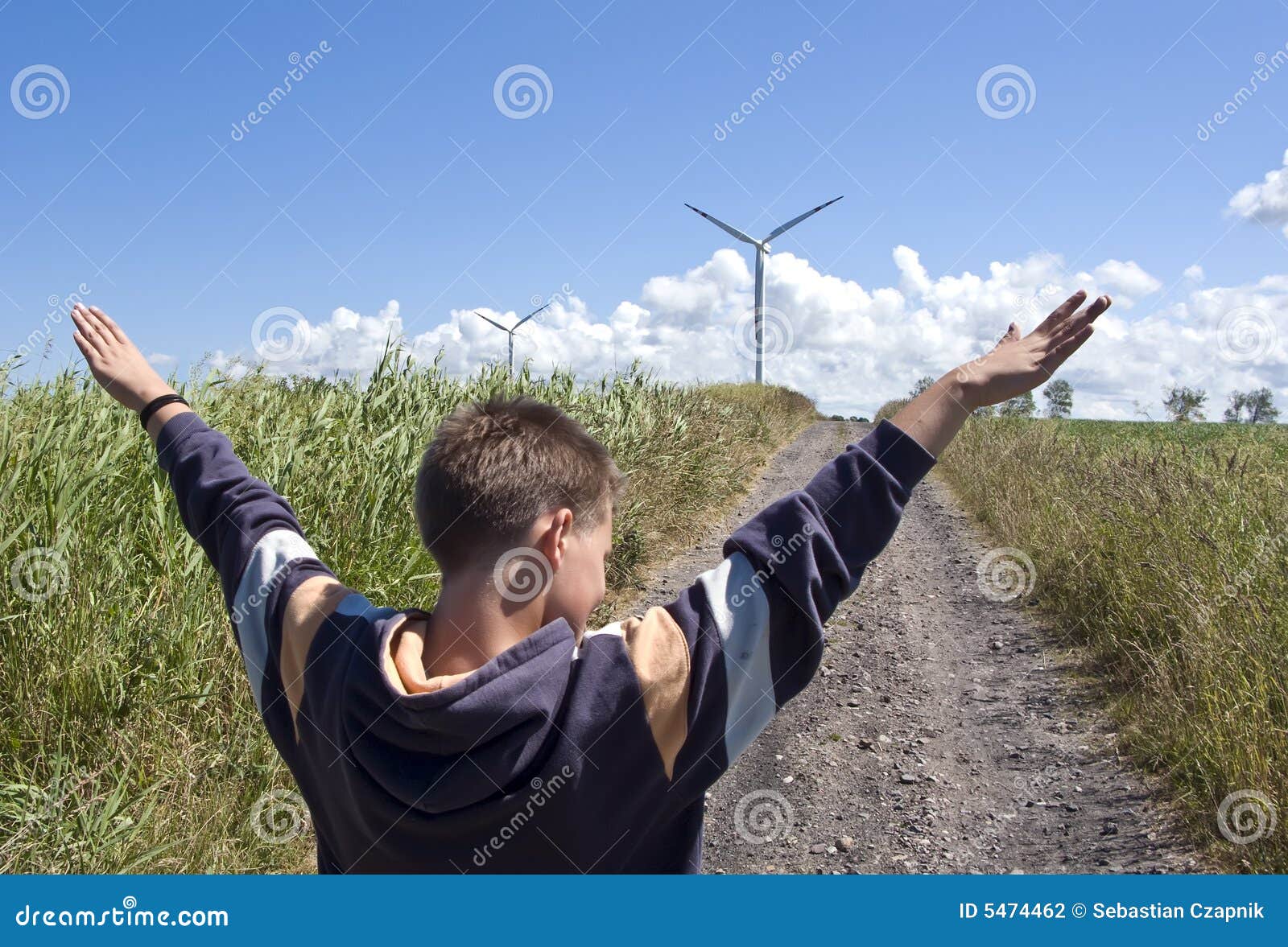 Boy and wind turbine stock photo. Image of mill, country - 5474462