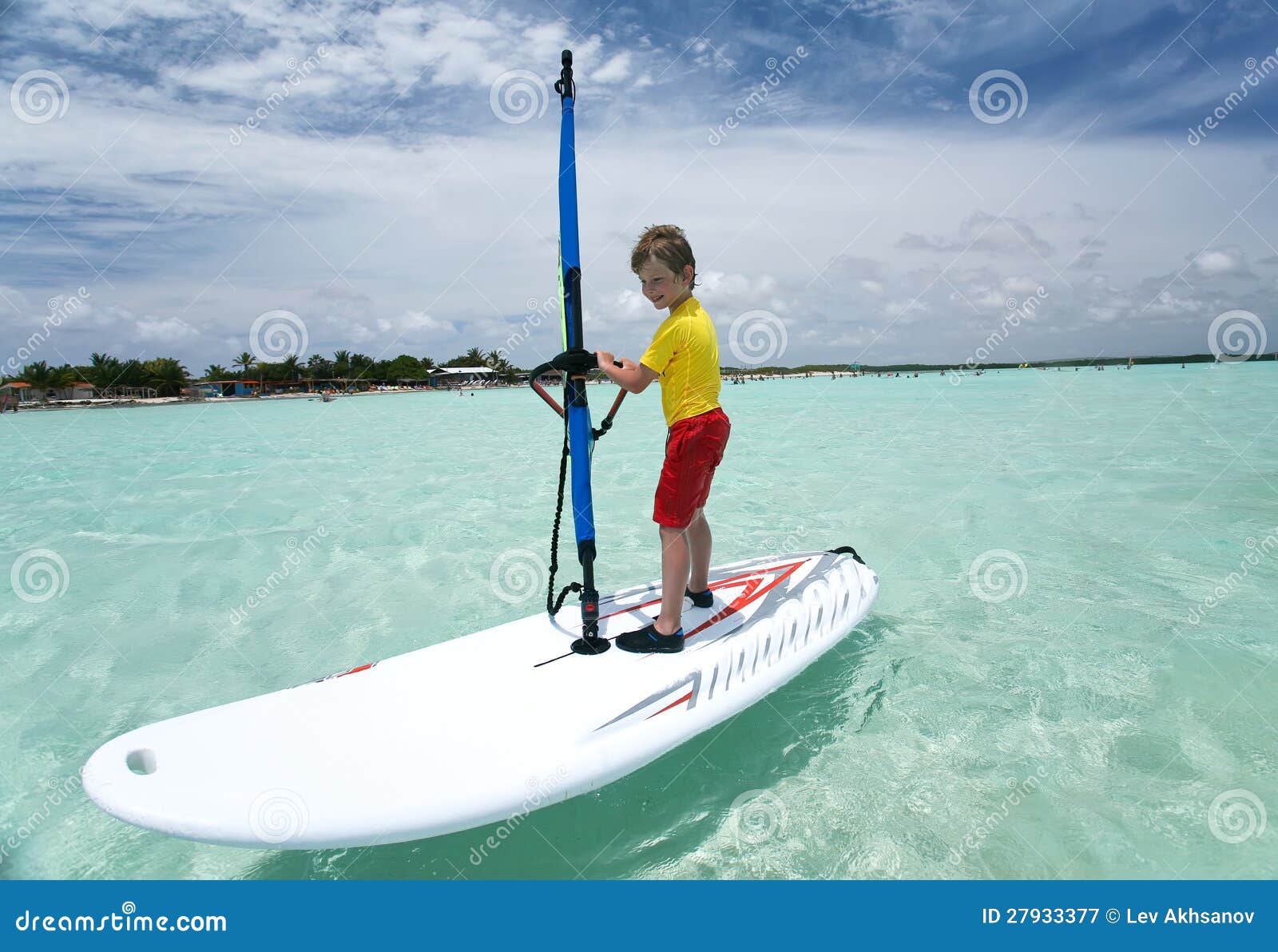 Boy on windsurfing board. stock image. Image of unspoiled - 27933377