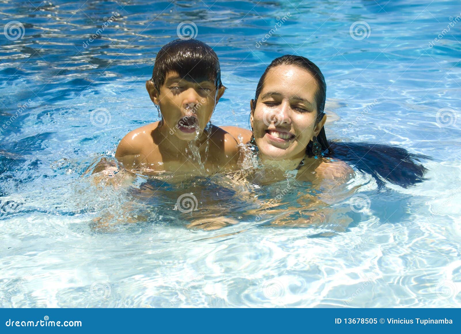 Boy and Woman in Pool stock image. Image of family, woman - 13678505