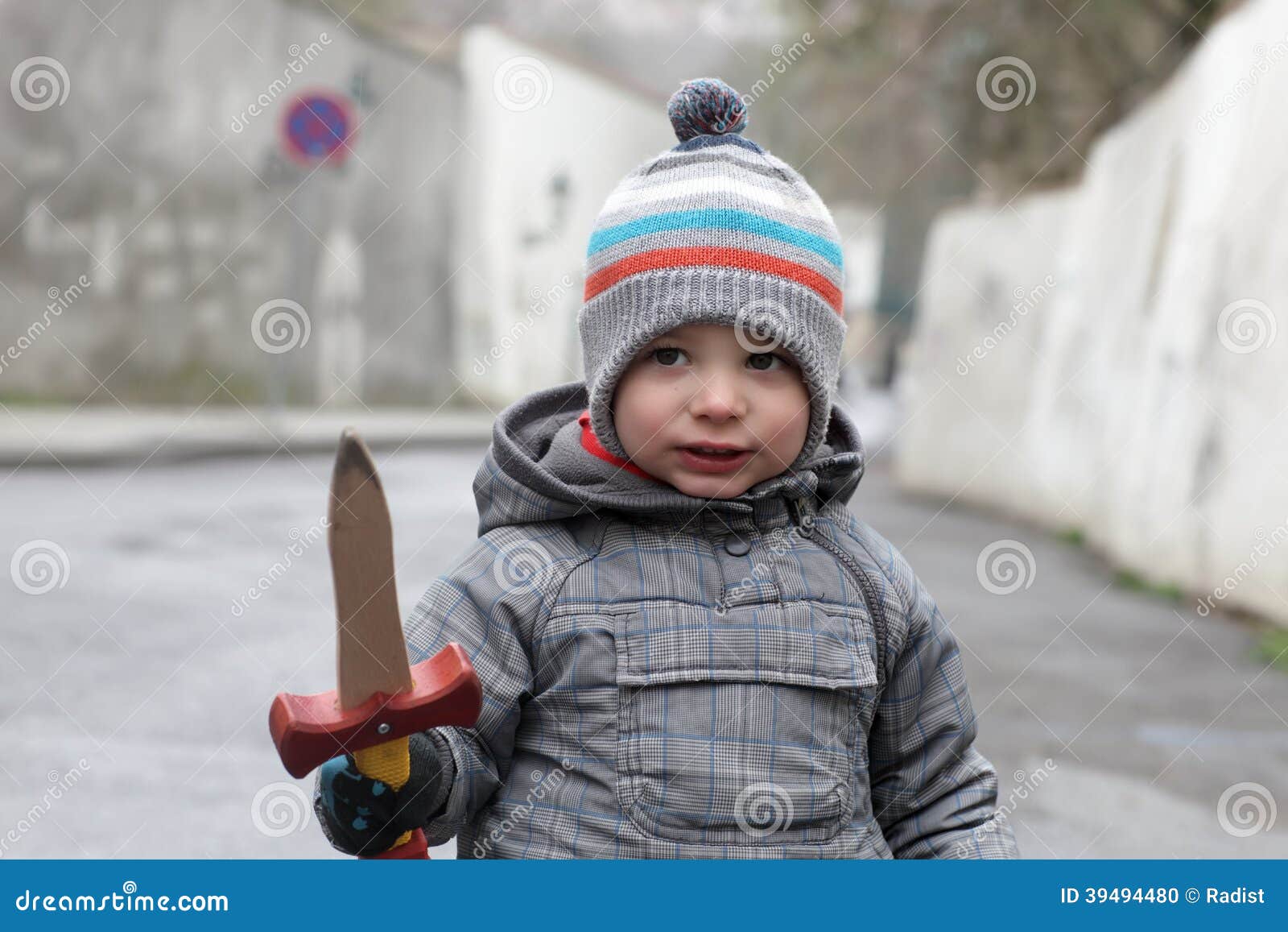 Boy with a wooden dagger stock photo. Image of human - 39494480