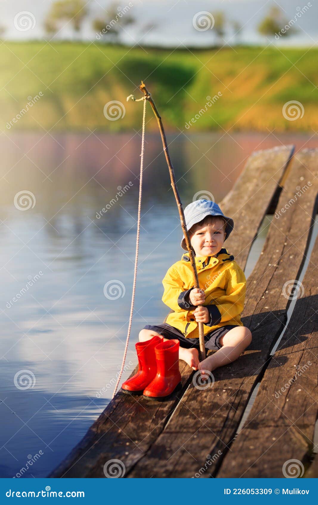 Boy on Wooden Dock with a Fishing Net Stock Image - Image of impatient ...