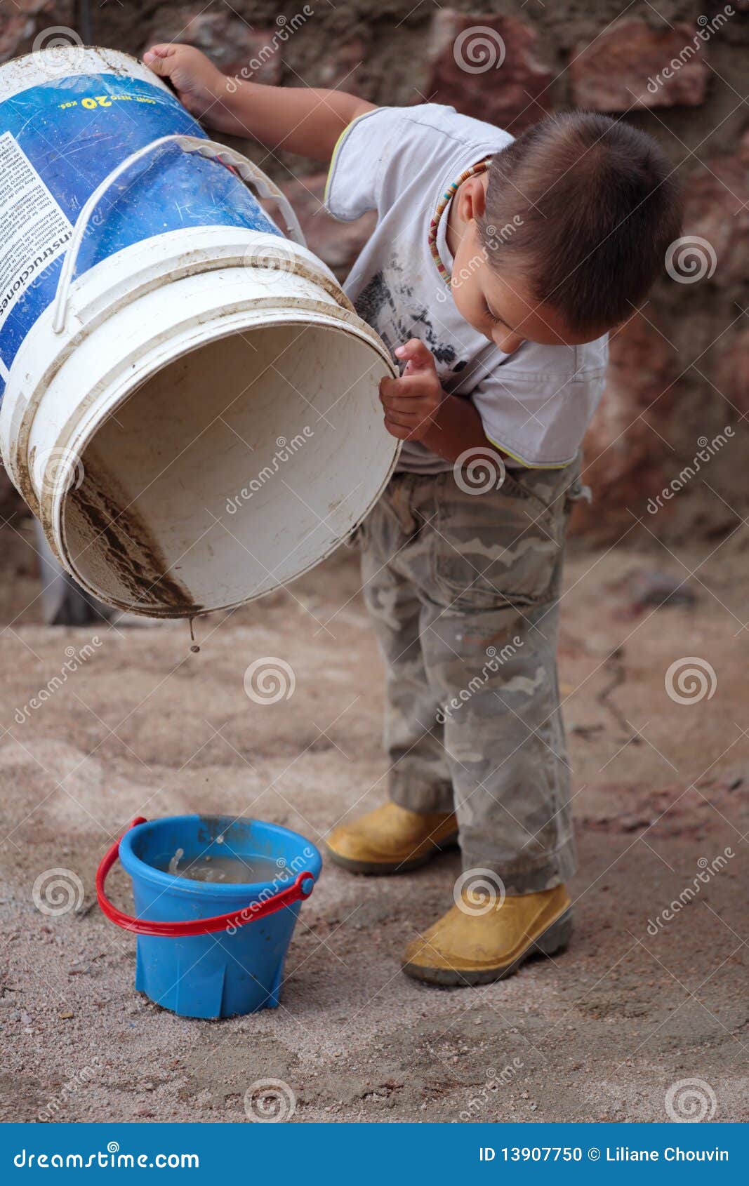 Boy at work stock photo. Image of buckets, build, dirty - 13907750