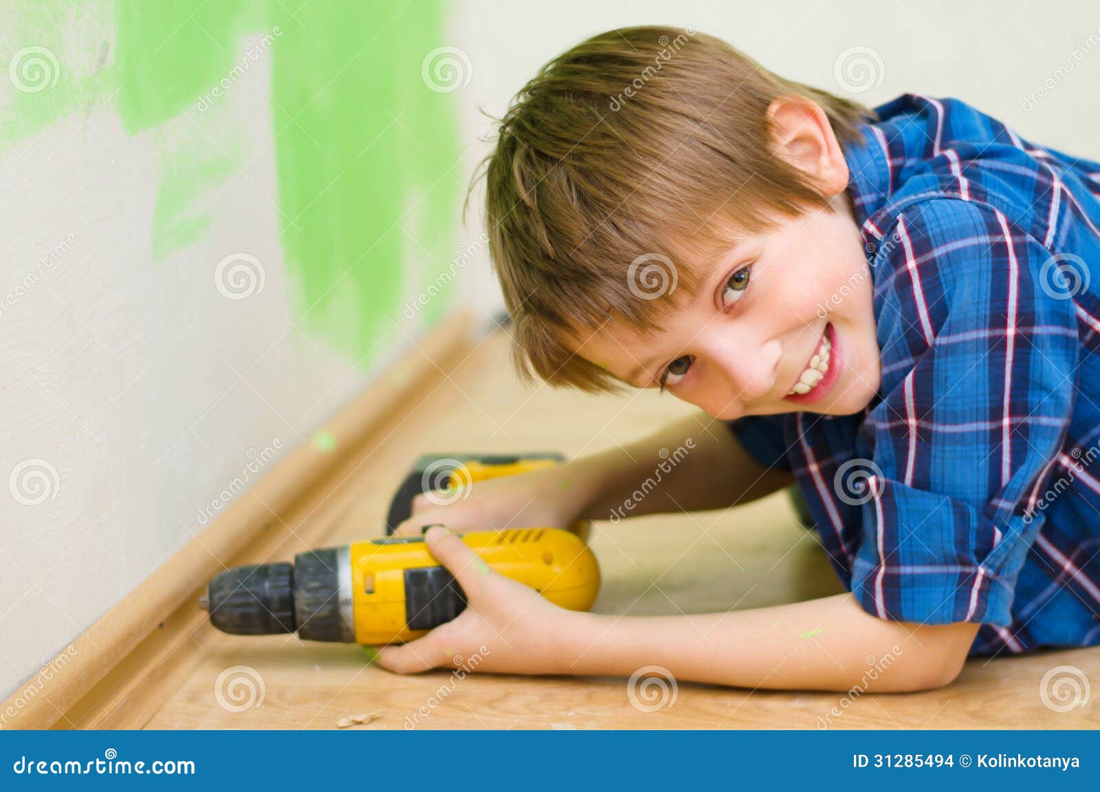 Boy Worker Installing Plinth Stock Photo - Image of equipment, install ...