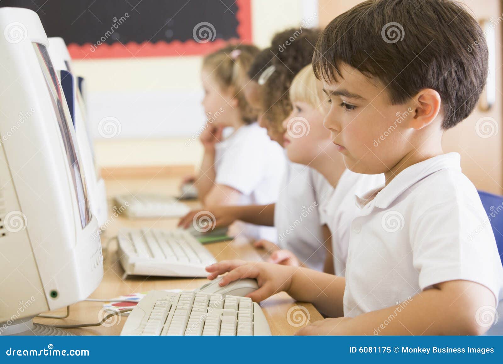 Boy Working on a Computer at Primary School Stock Image - Image of ...