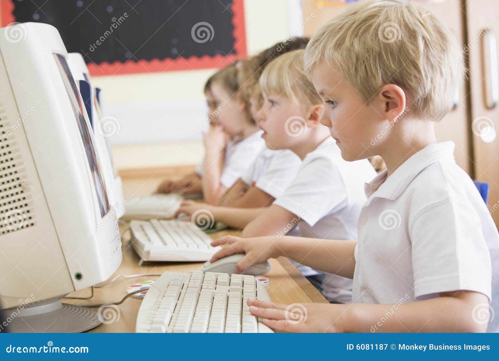 Boy Working on a Computer at Primary School Stock Image - Image of ...