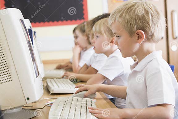 Boy Working on a Computer at Primary School Stock Image - Image of ...