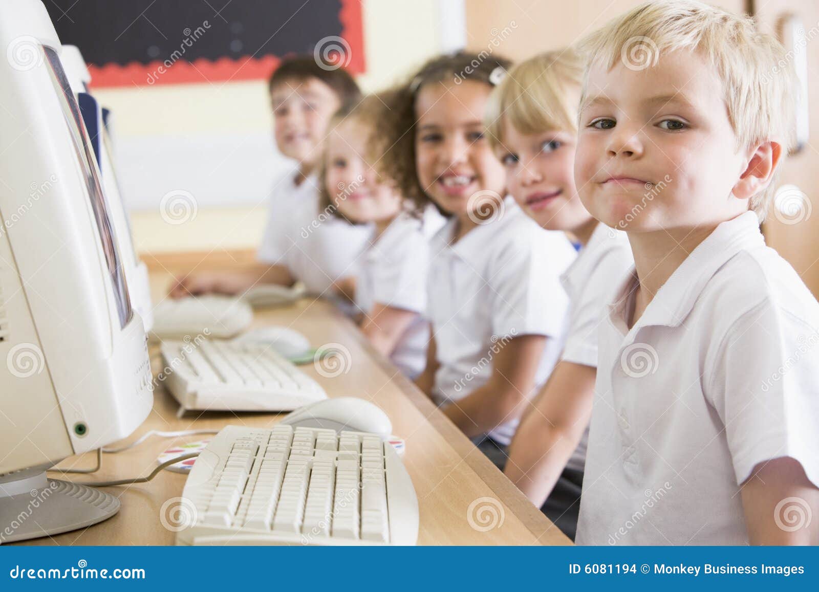 Boy Working on a Computer at Primary School Stock Photo - Image of ...