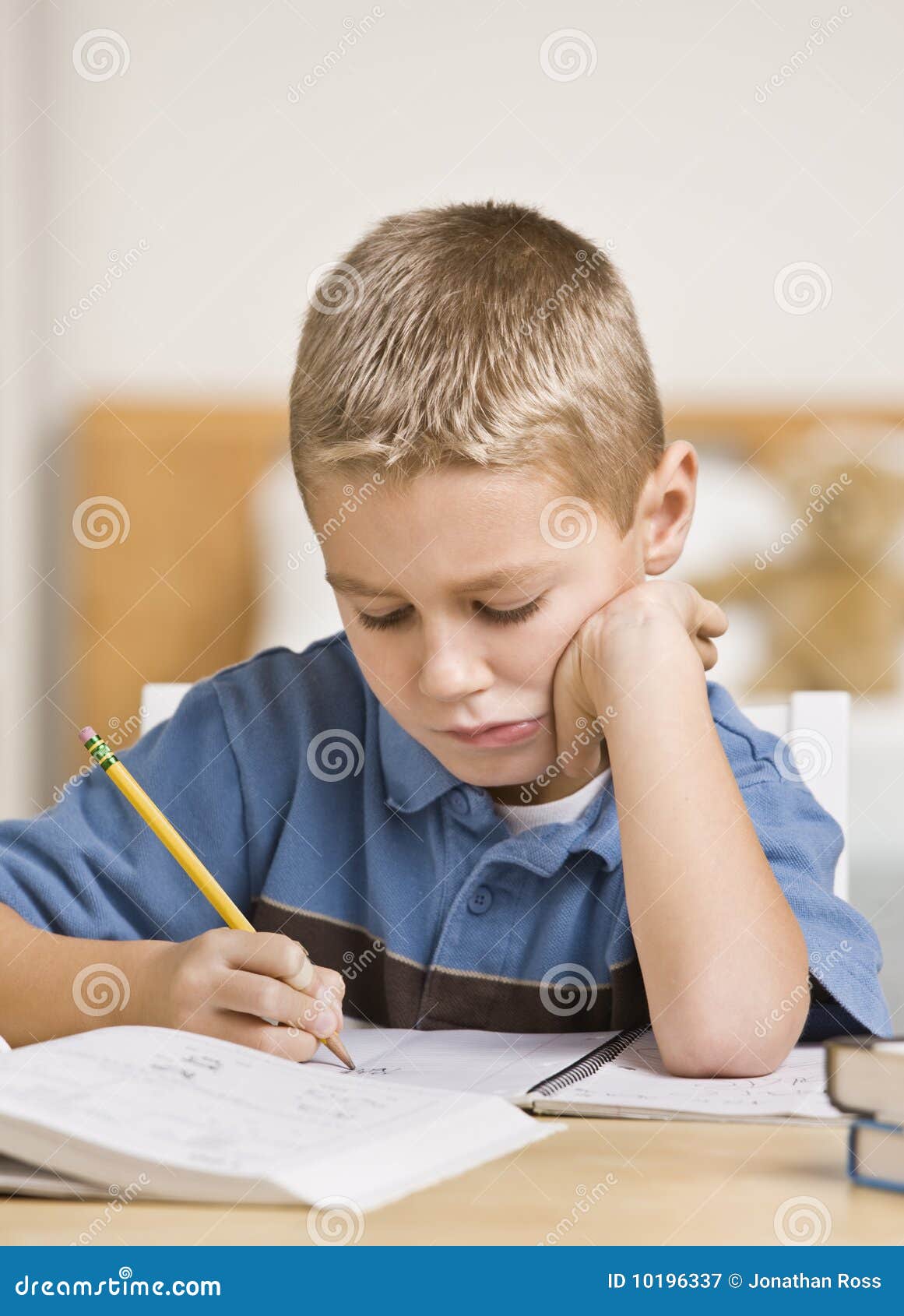 Boy Working on Homework stock image. Image of family - 10196337
