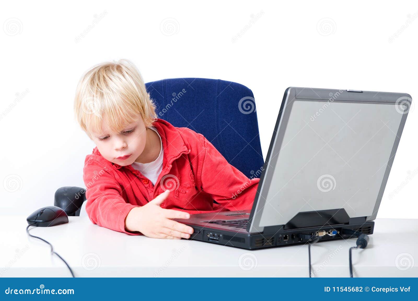 Boy working on a laptop stock photo. Image of person - 11545682