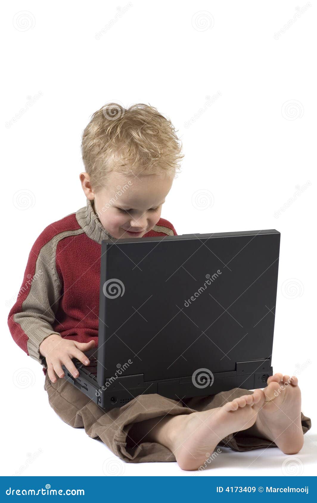 Boy working on a laptop 2 stock image. Image of computer - 4173409