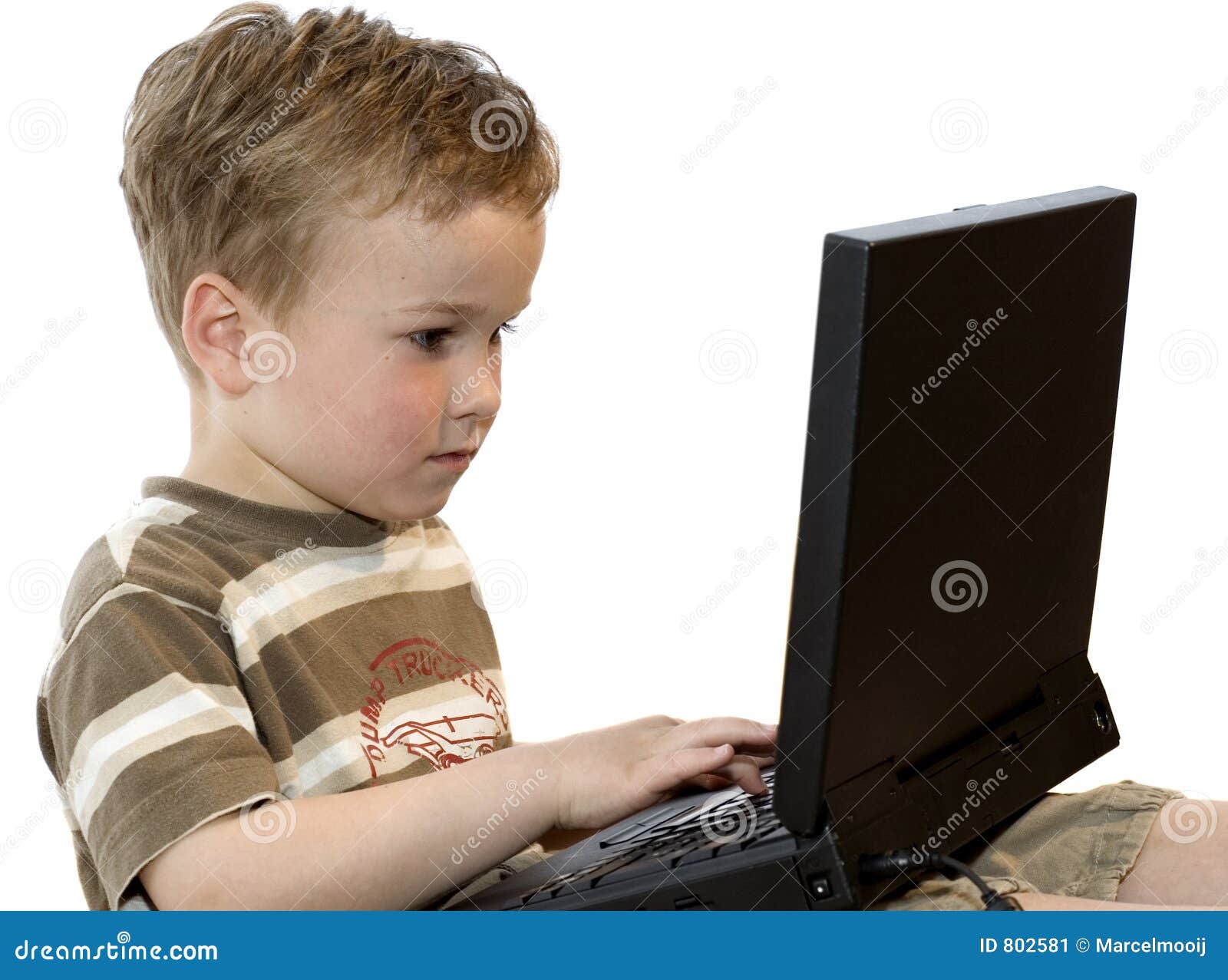 Boy working on a laptop stock image. Image of searches - 802581