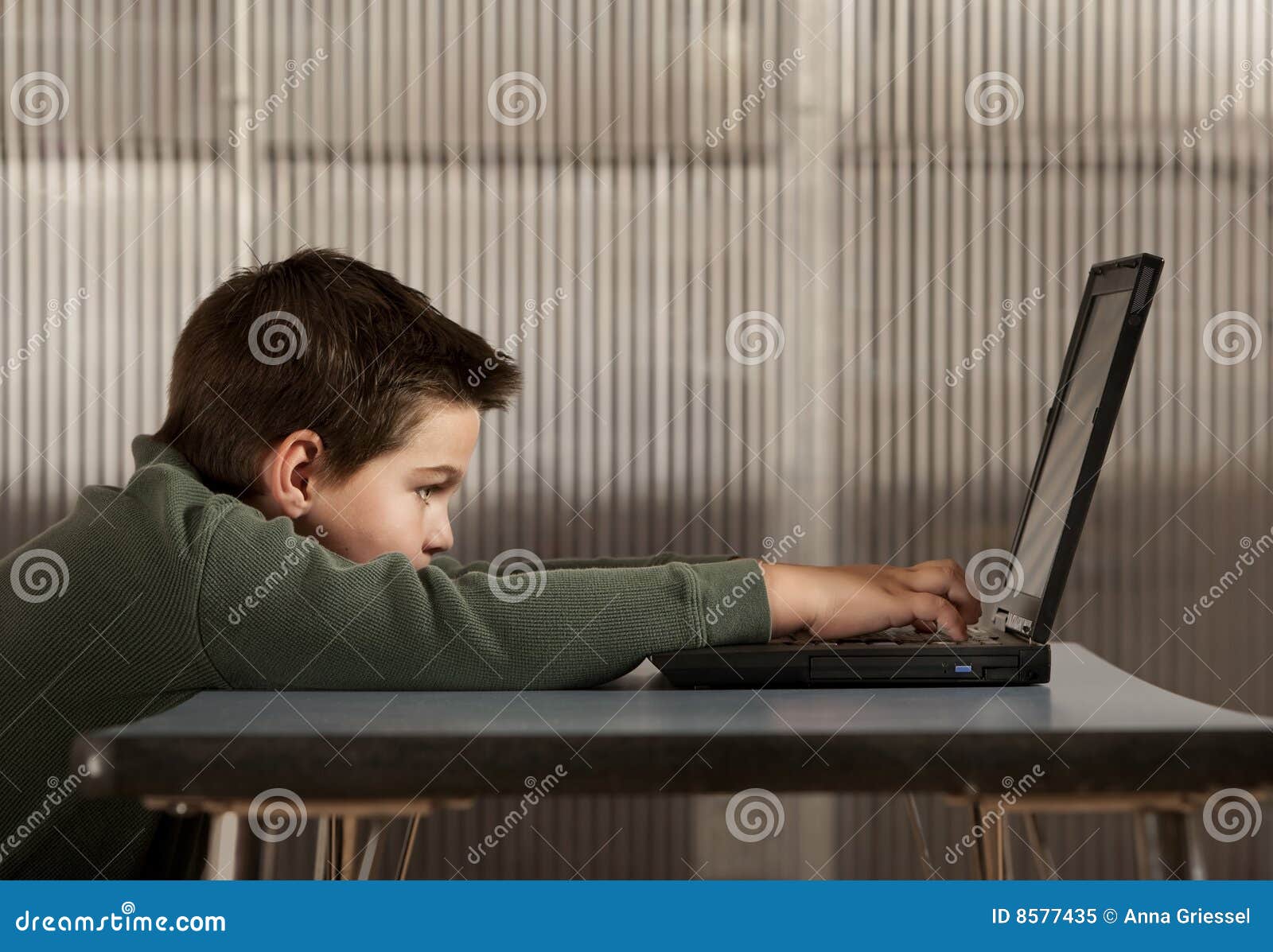 Boy Working on a Laptop Computer Stock Image - Image of male, young ...