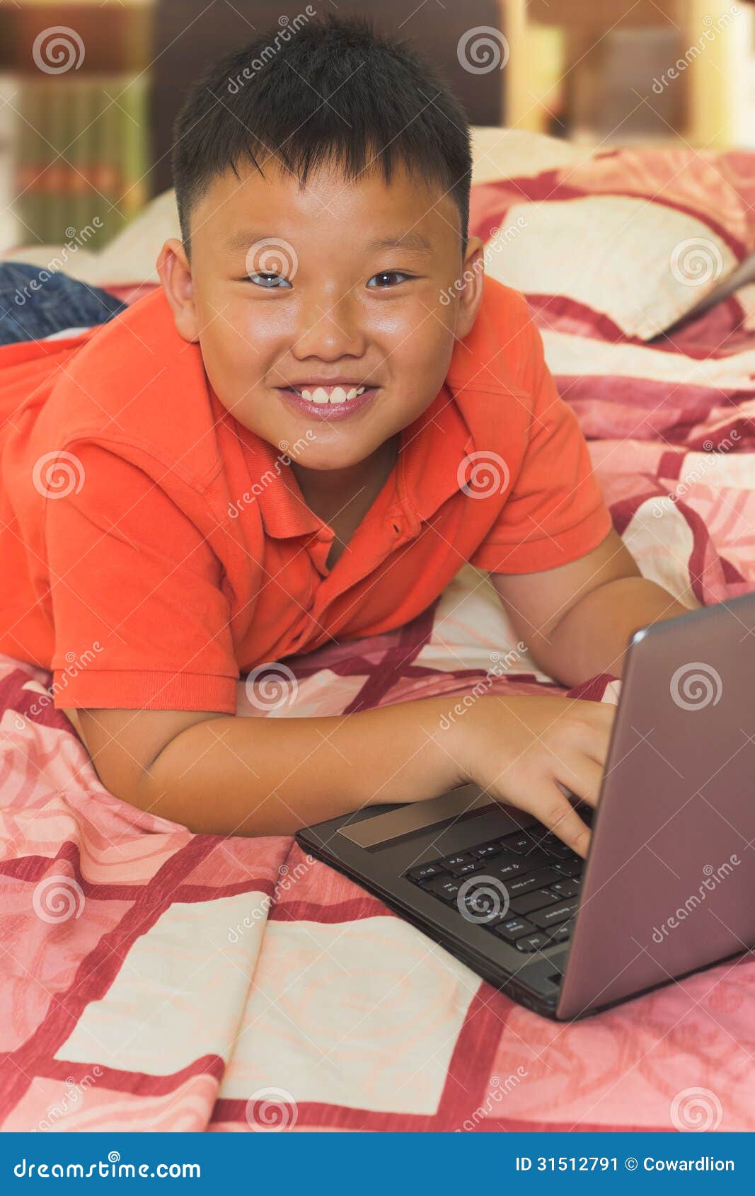 A Boy Working on a Laptop Computer Stock Image - Image of enjoy ...
