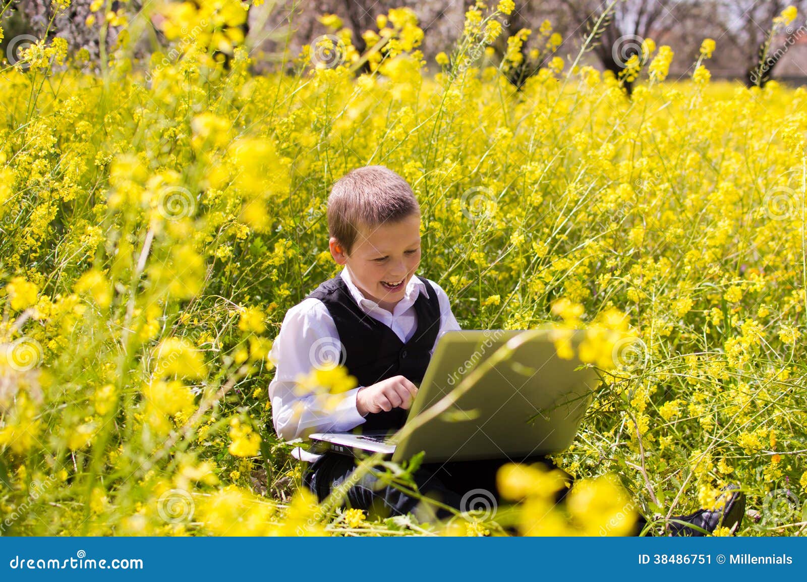 Boy working on laptop stock image. Image of modern, happy - 38486751