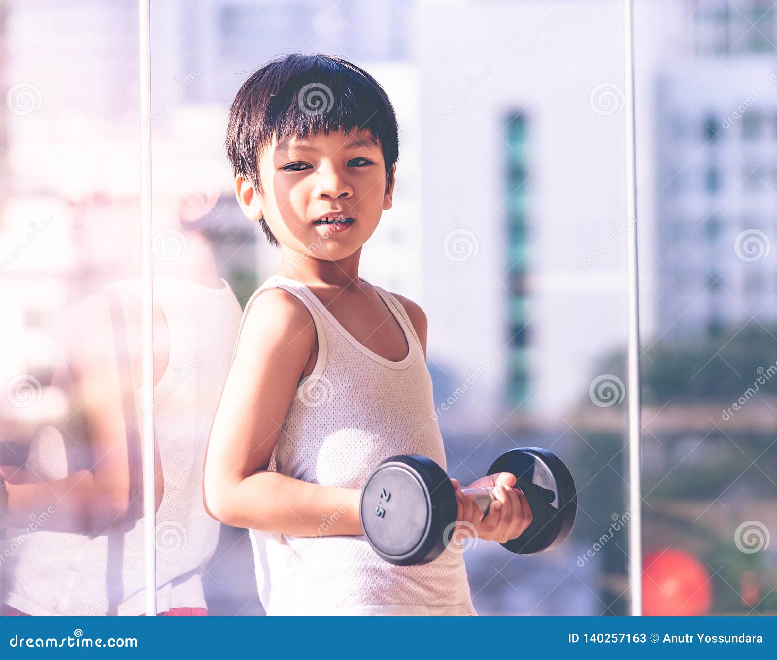 Boy Working Out with Dumbbells in a Gym Stock Image - Image of child ...