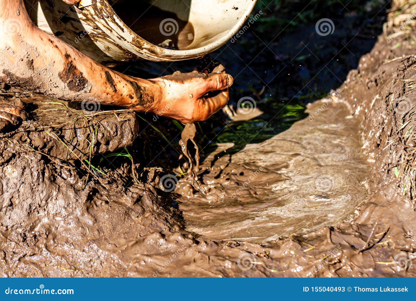 Boy Working and Playing in the Mud Stock Image - Image of human, grace ...