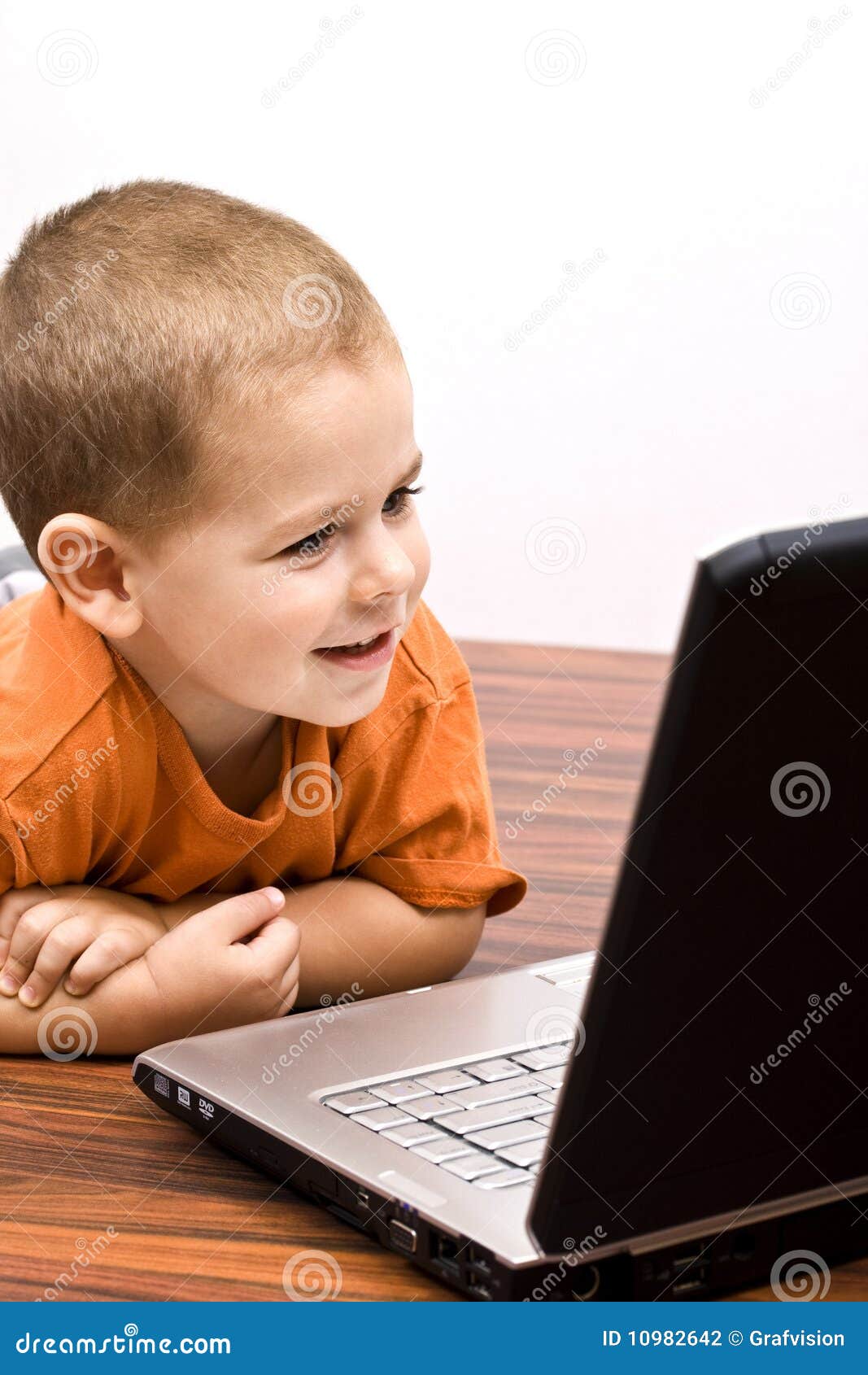Boy working whit laptop stock photo. Image of computer - 10982642