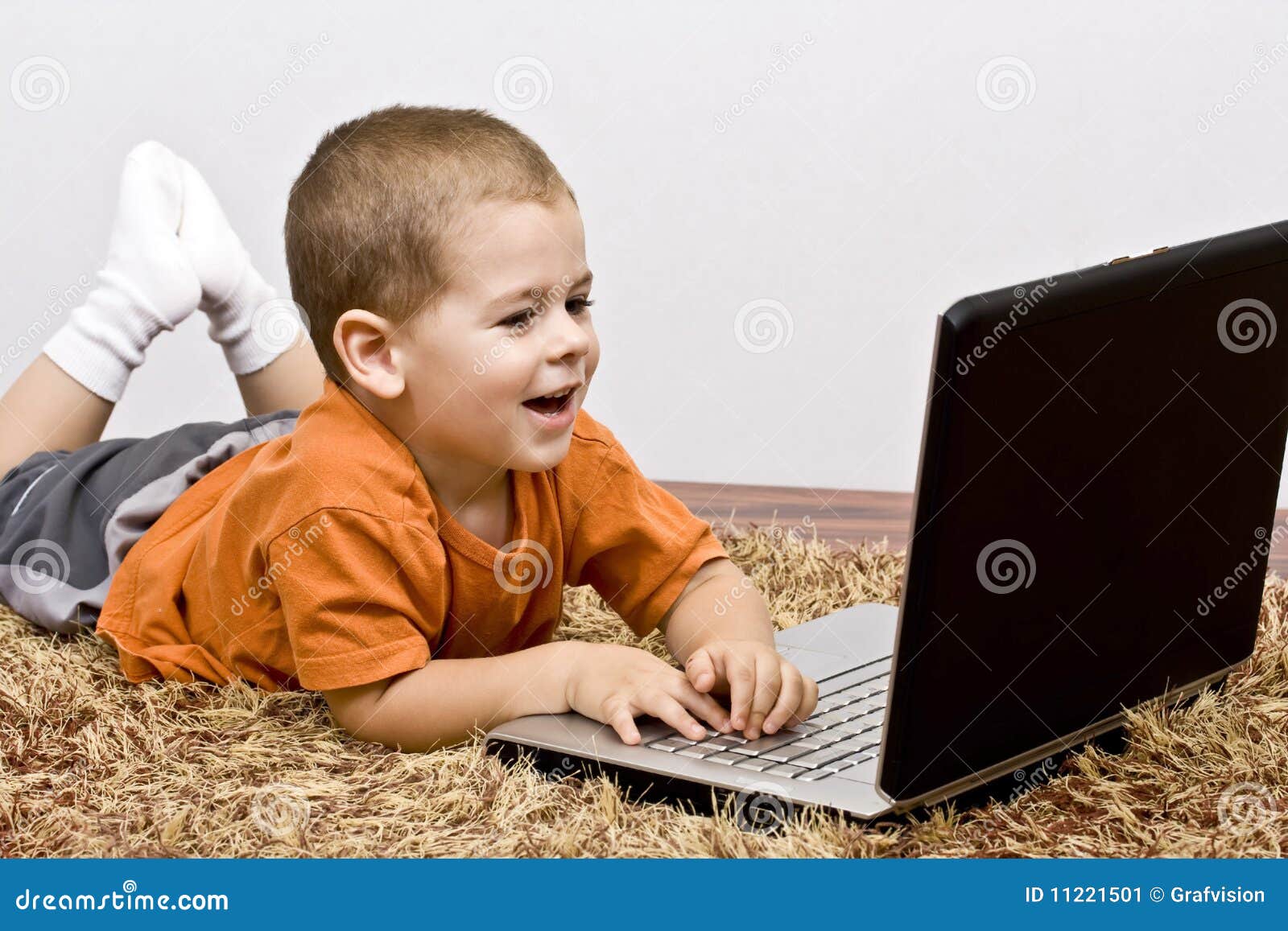 Boy working whit laptop stock image. Image of casual - 11221501