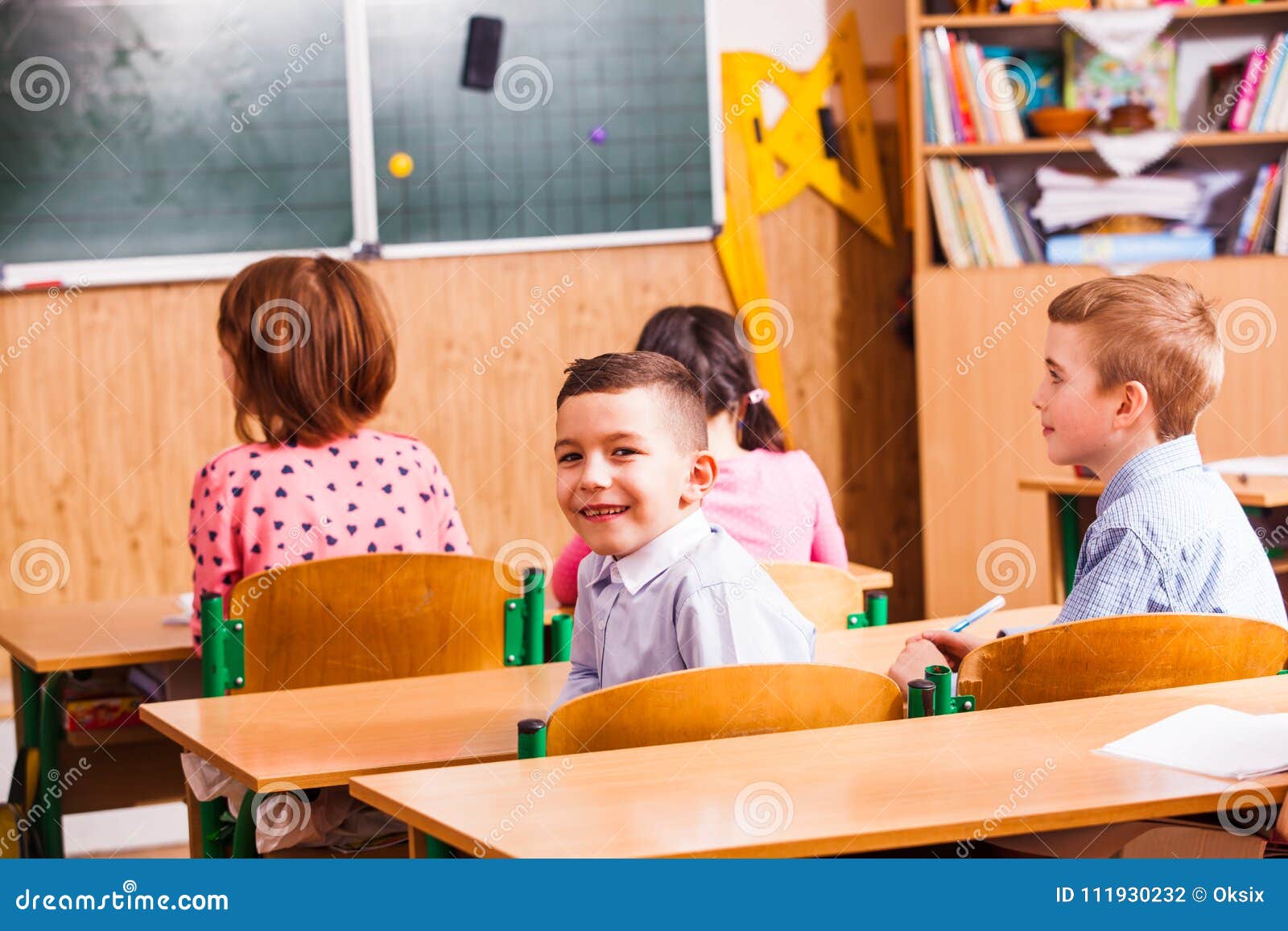 Boy write in the copybook stock photo. Image of little - 111930232