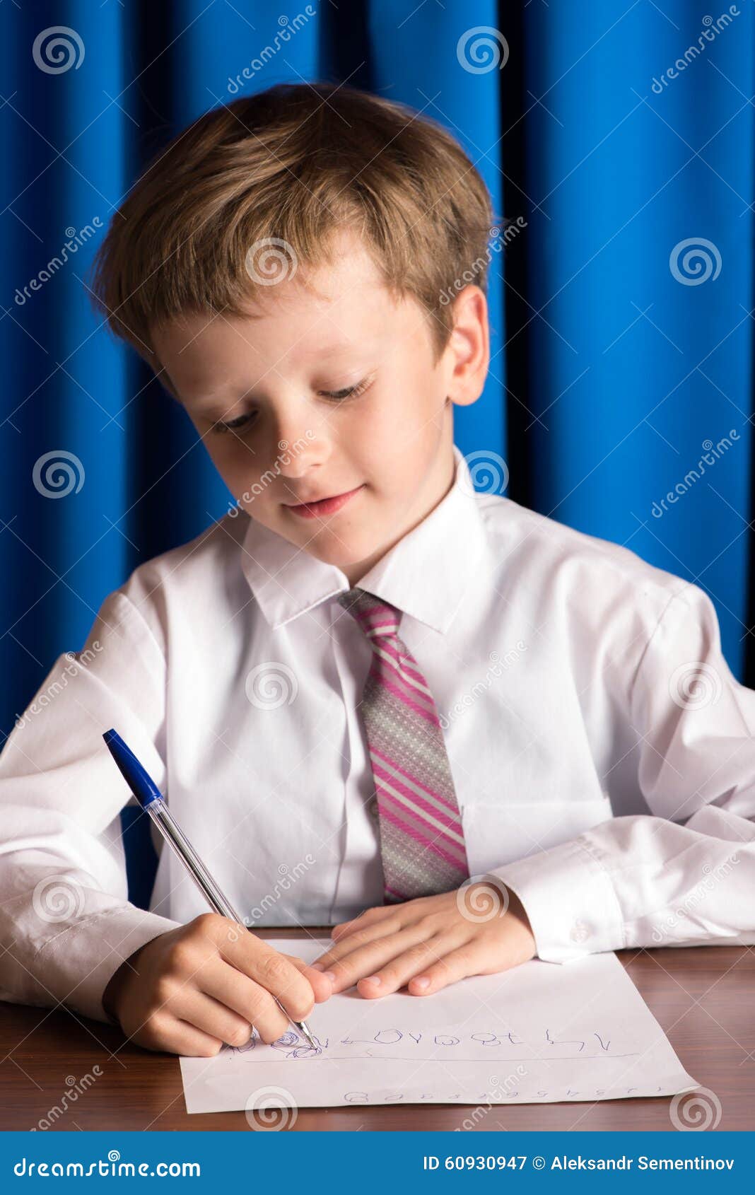 Boy Writes on a Sheet of Paper Stock Image - Image of education, desk ...