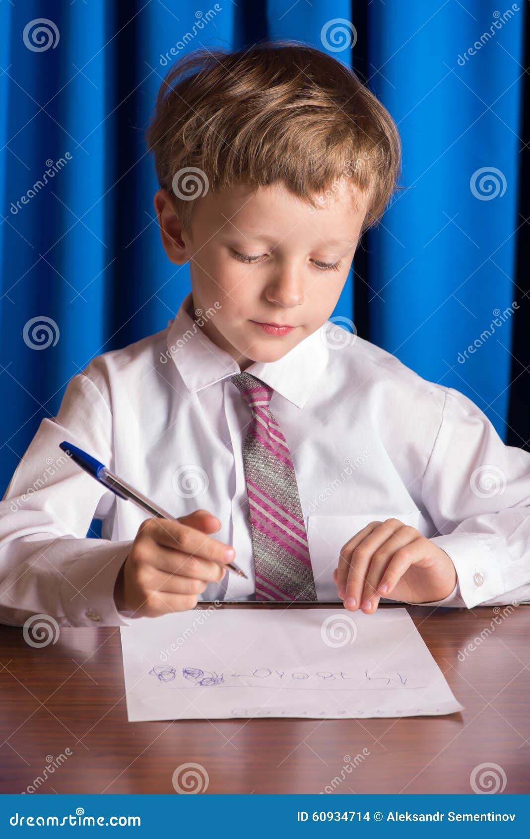 Boy Writes on a Sheet of Paper Stock Photo - Image of student, people ...