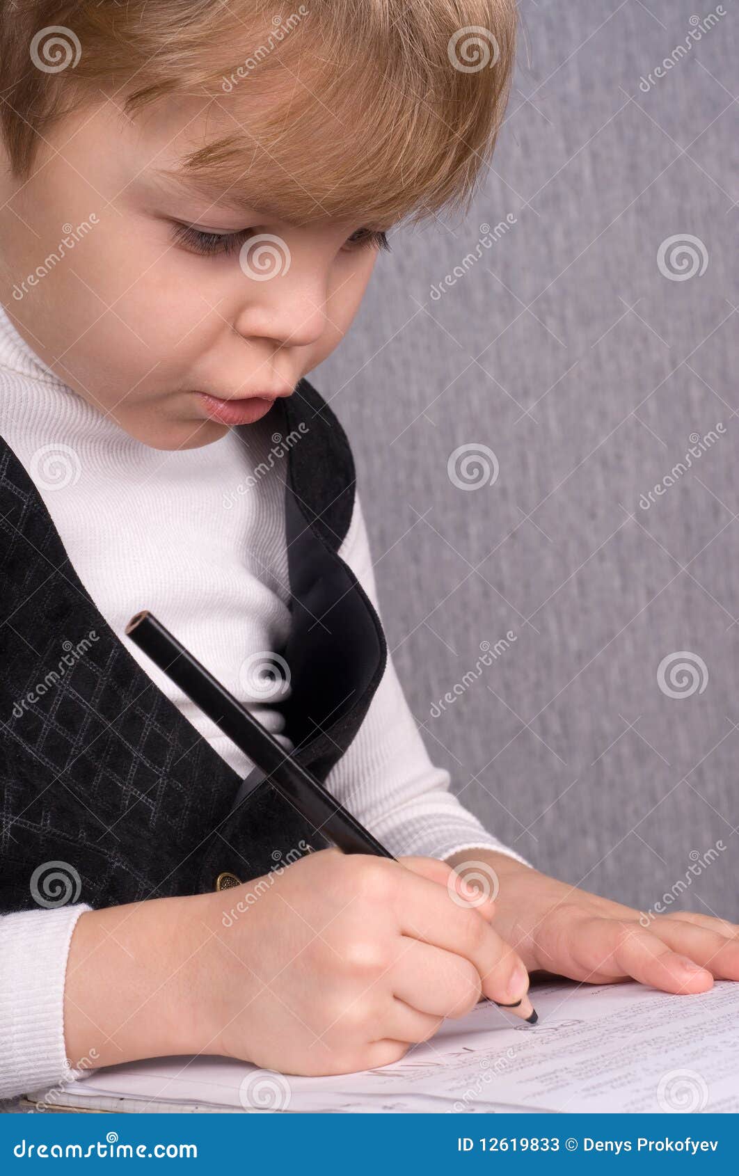 Boy writing stock image. Image of preschool, looking - 12619833