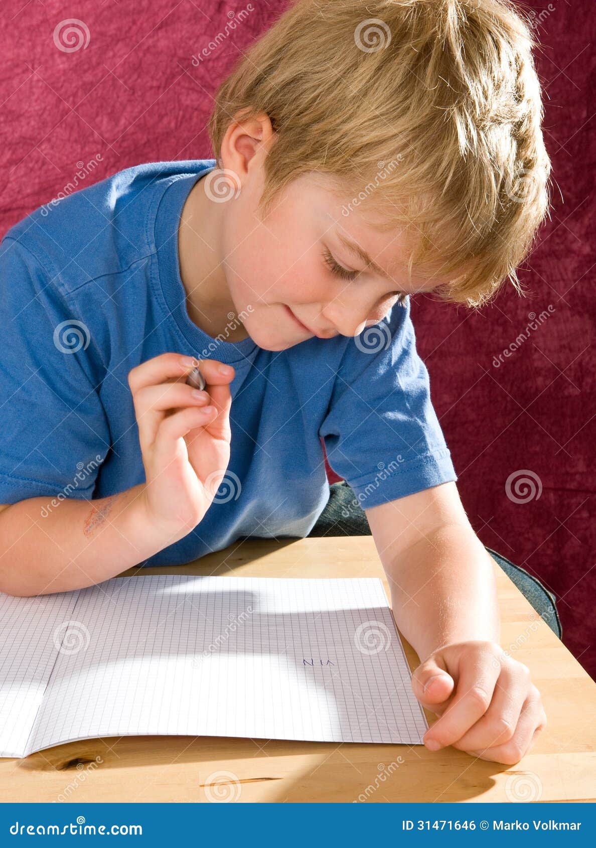 Boy is writing stock photo. Image of protection, child - 31471646