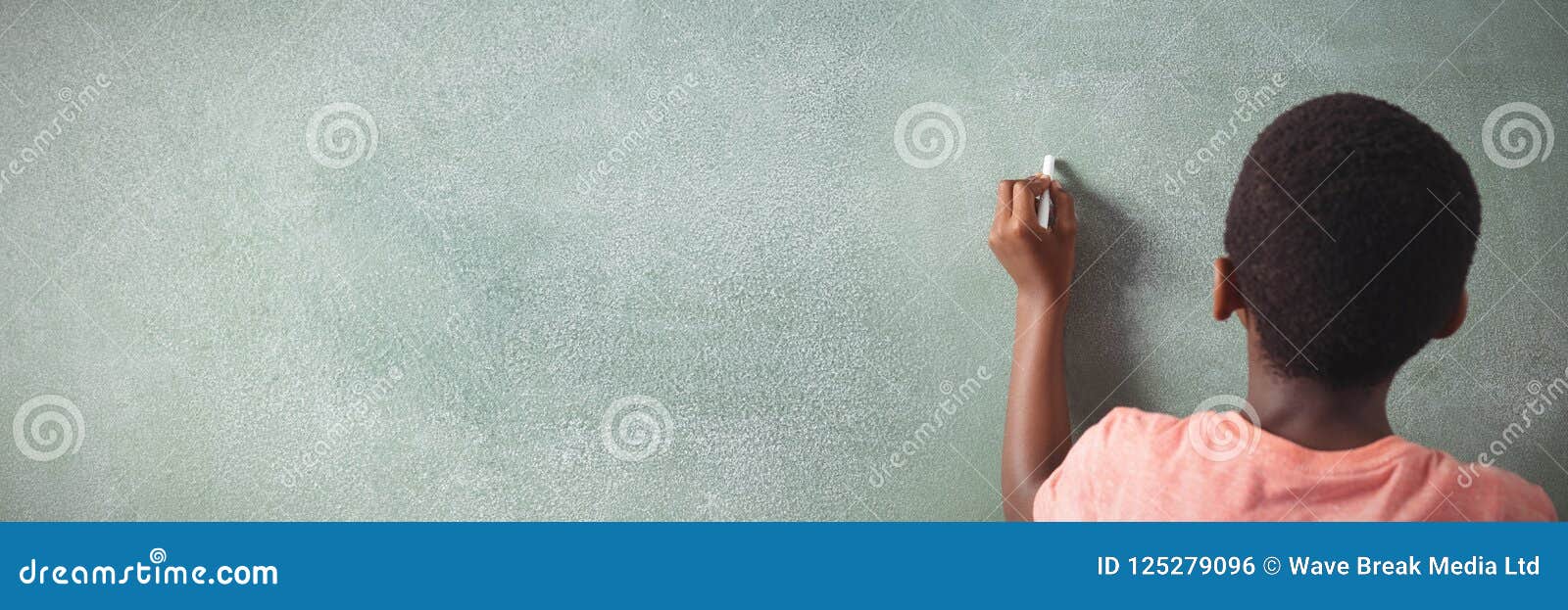 Boy Writing with Chalk on Greenboard Stock Photo - Image of elementary ...